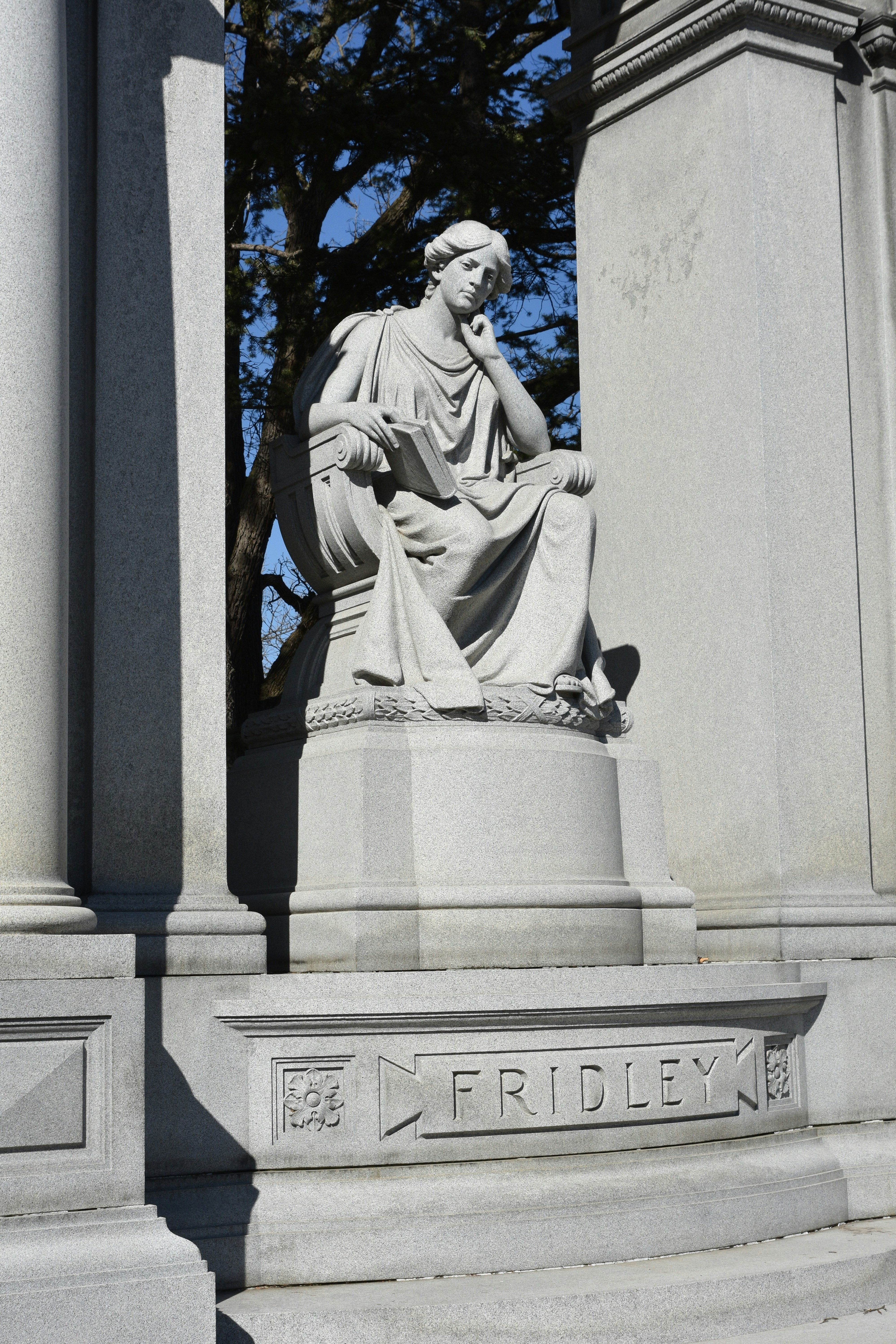 A statue of a woman sitting on a pedestal photo – Free Monument Image ...