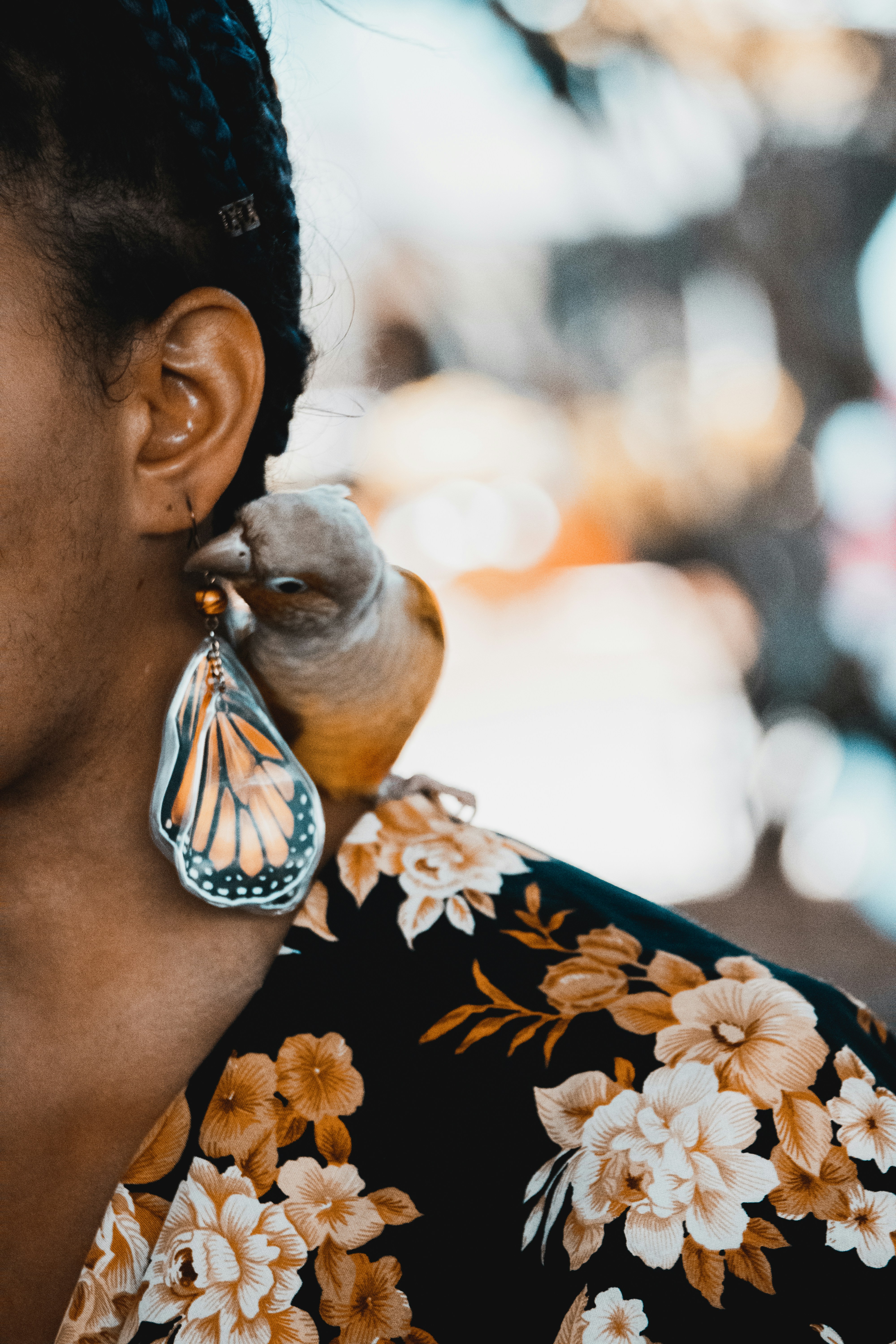 Butterfly Earring Echo: Portrait of a Woman with a Monarch Accent