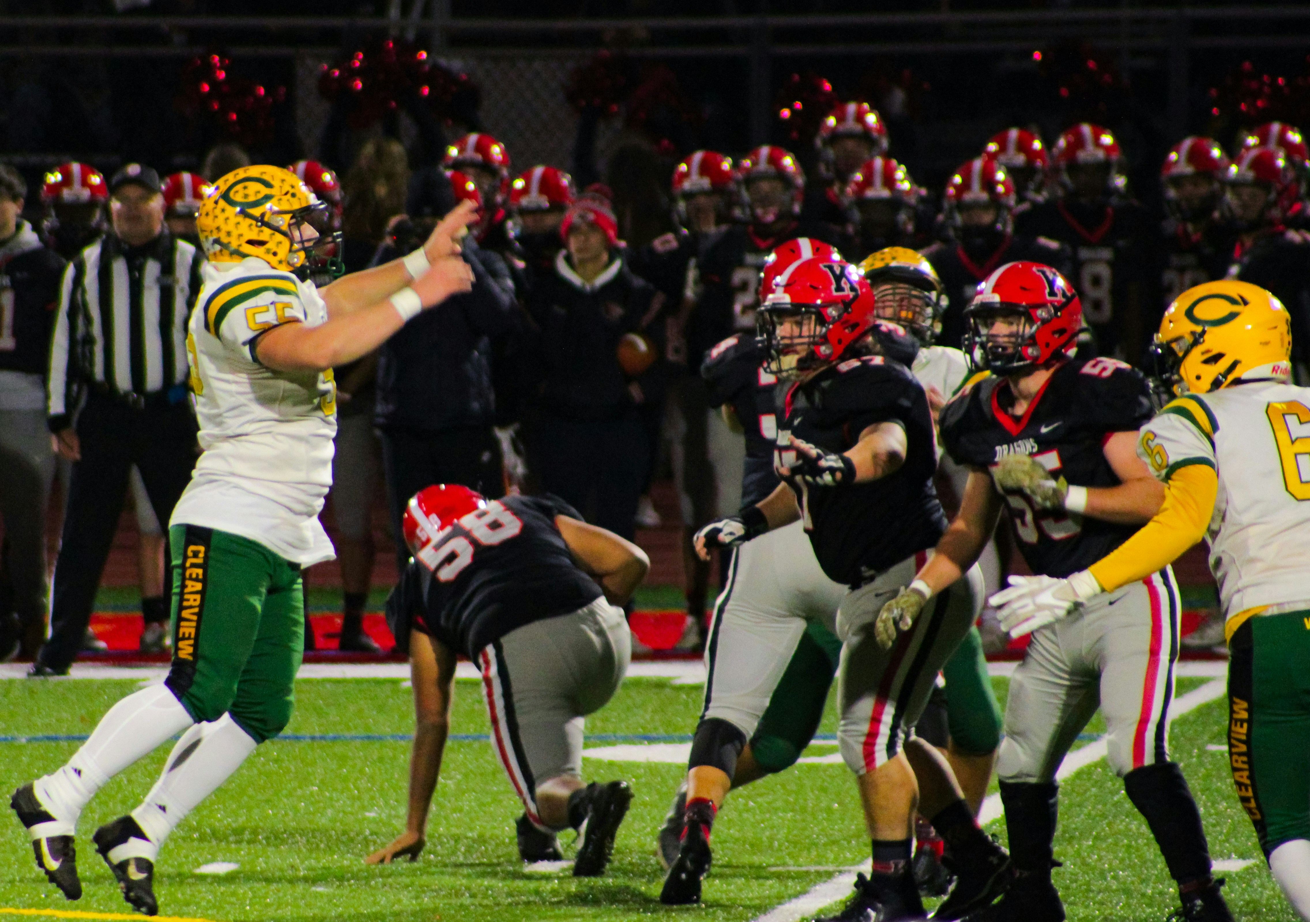 A group of football players playing a game of football photo – Free ...