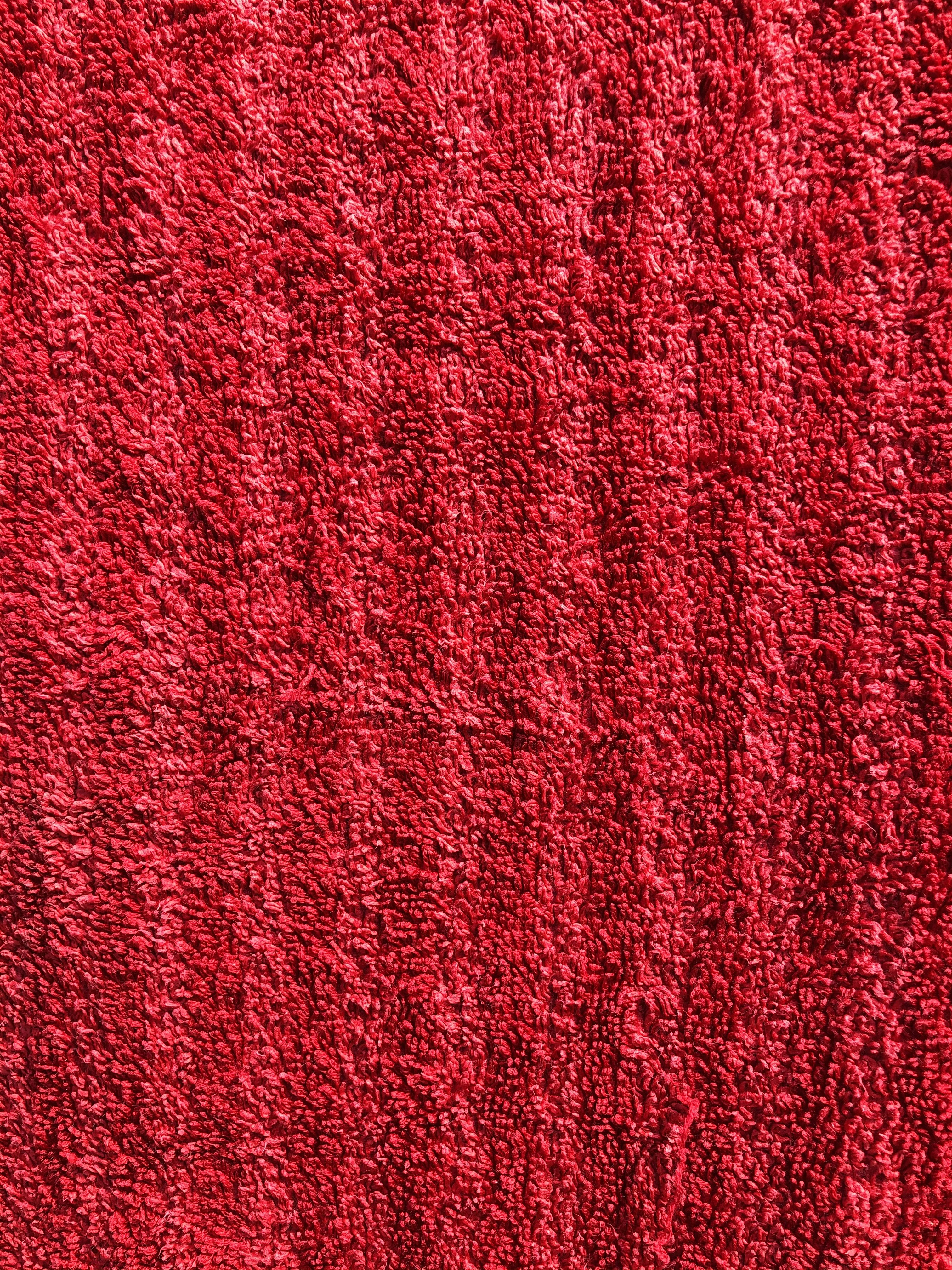 Gros plan d’un tapis rouge photo – Photo Rouge Gratuite sur Unsplash