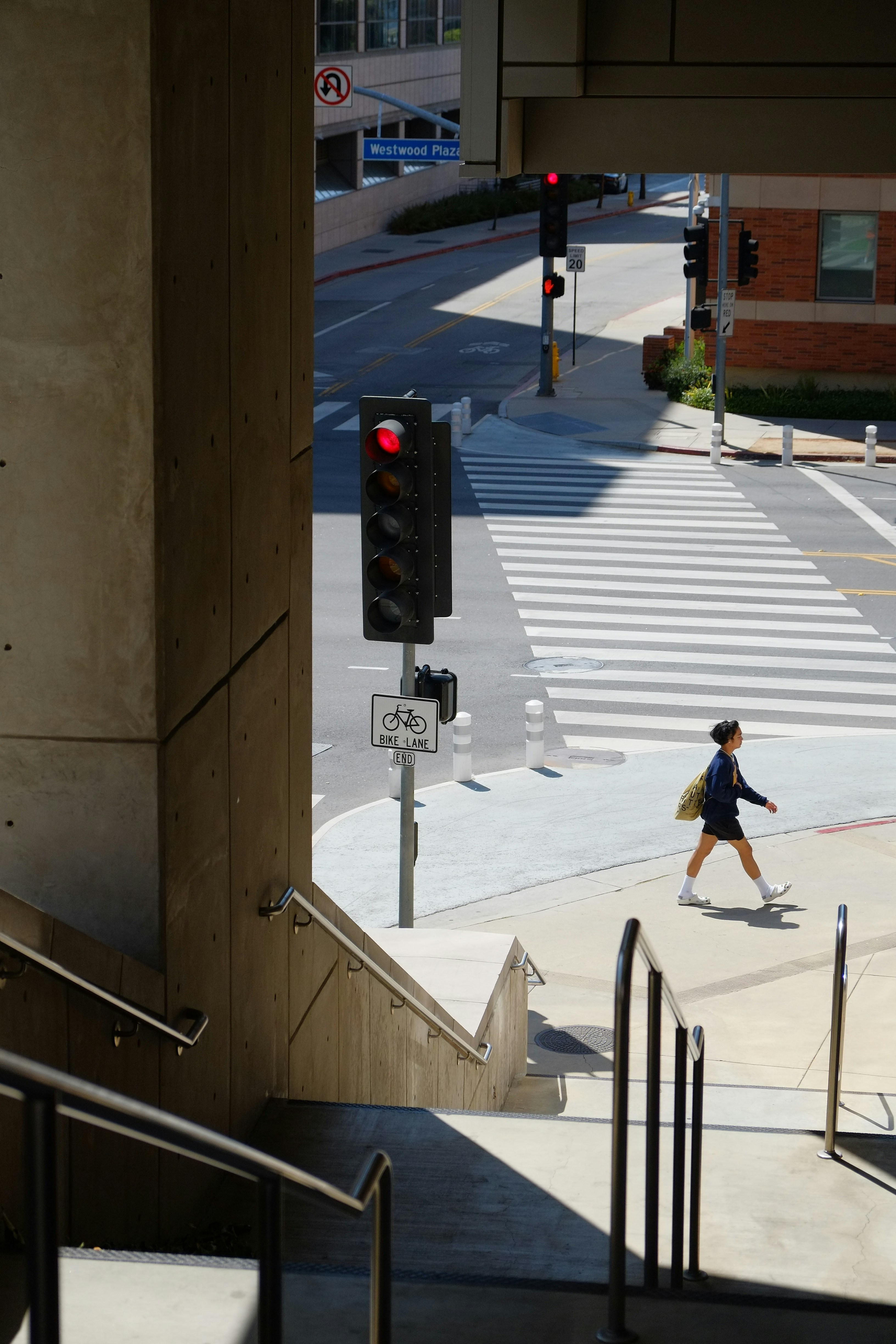 Crosswalk Pulse: A Student Steps Through Sunlit Lines