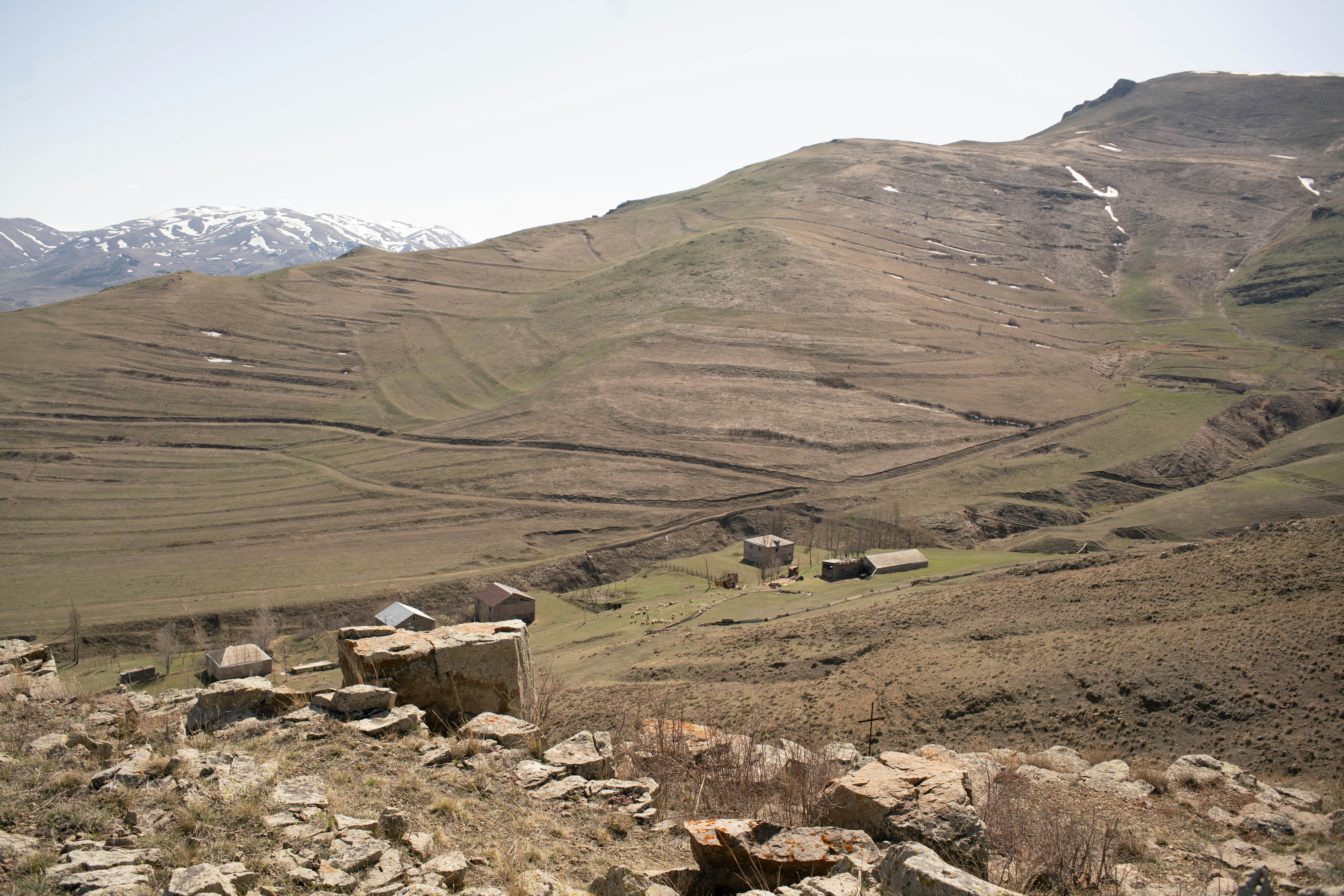Stone-Terraced Village Clinging to a Quiet Highland Slope