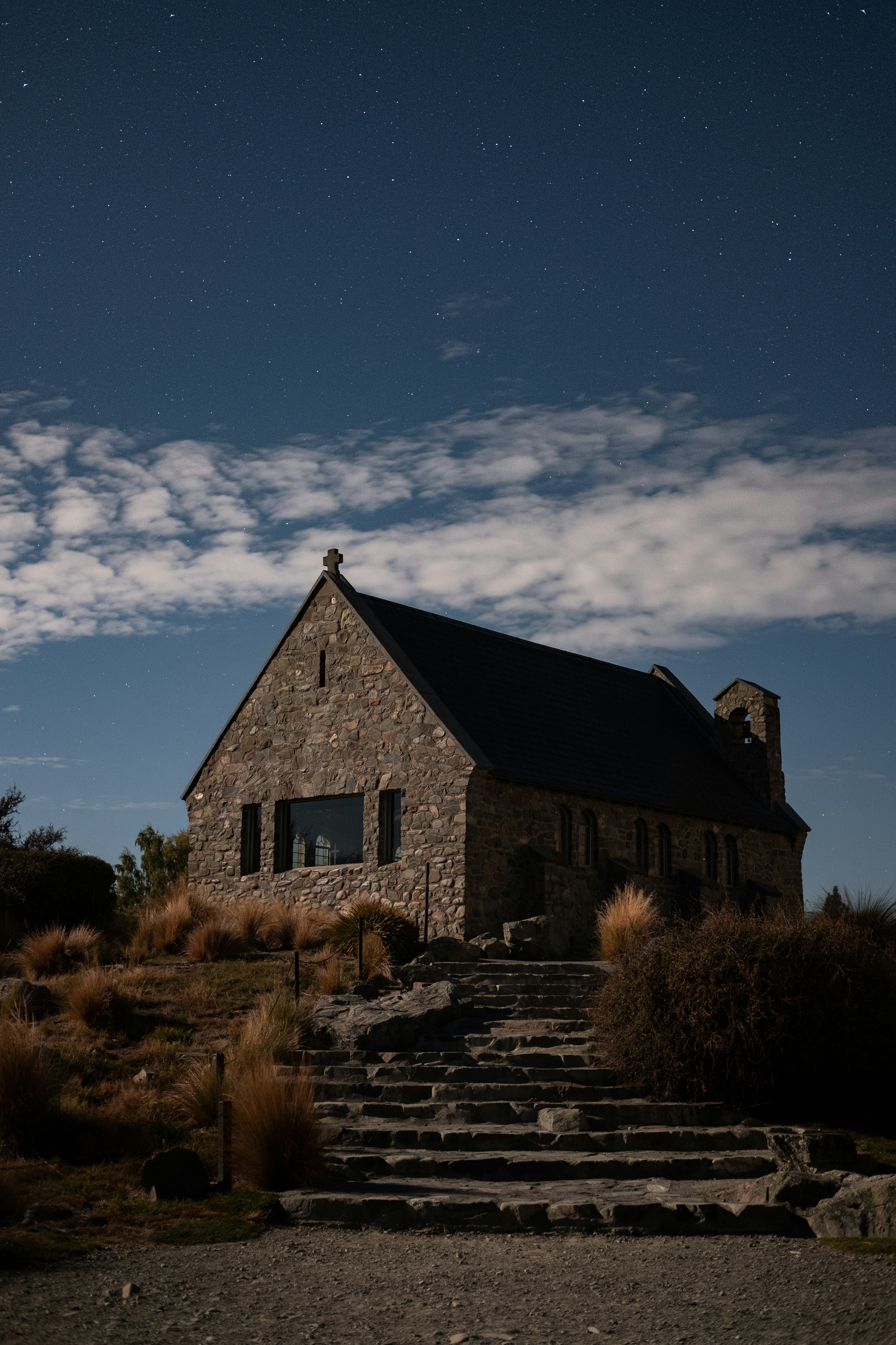 Moonlit Chapel Rising from Stone Steps