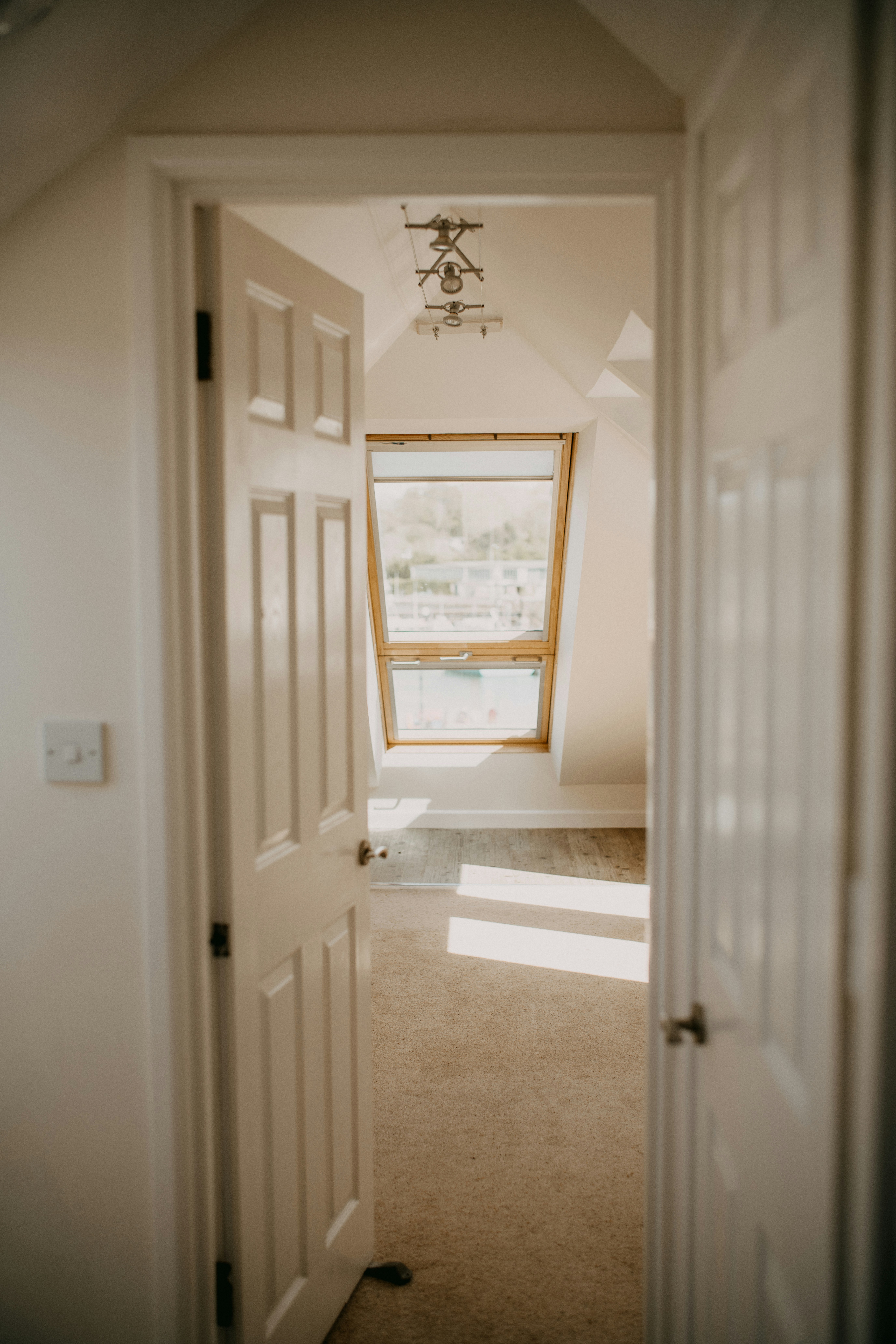Dormer Light at the End of a Quiet Hallway