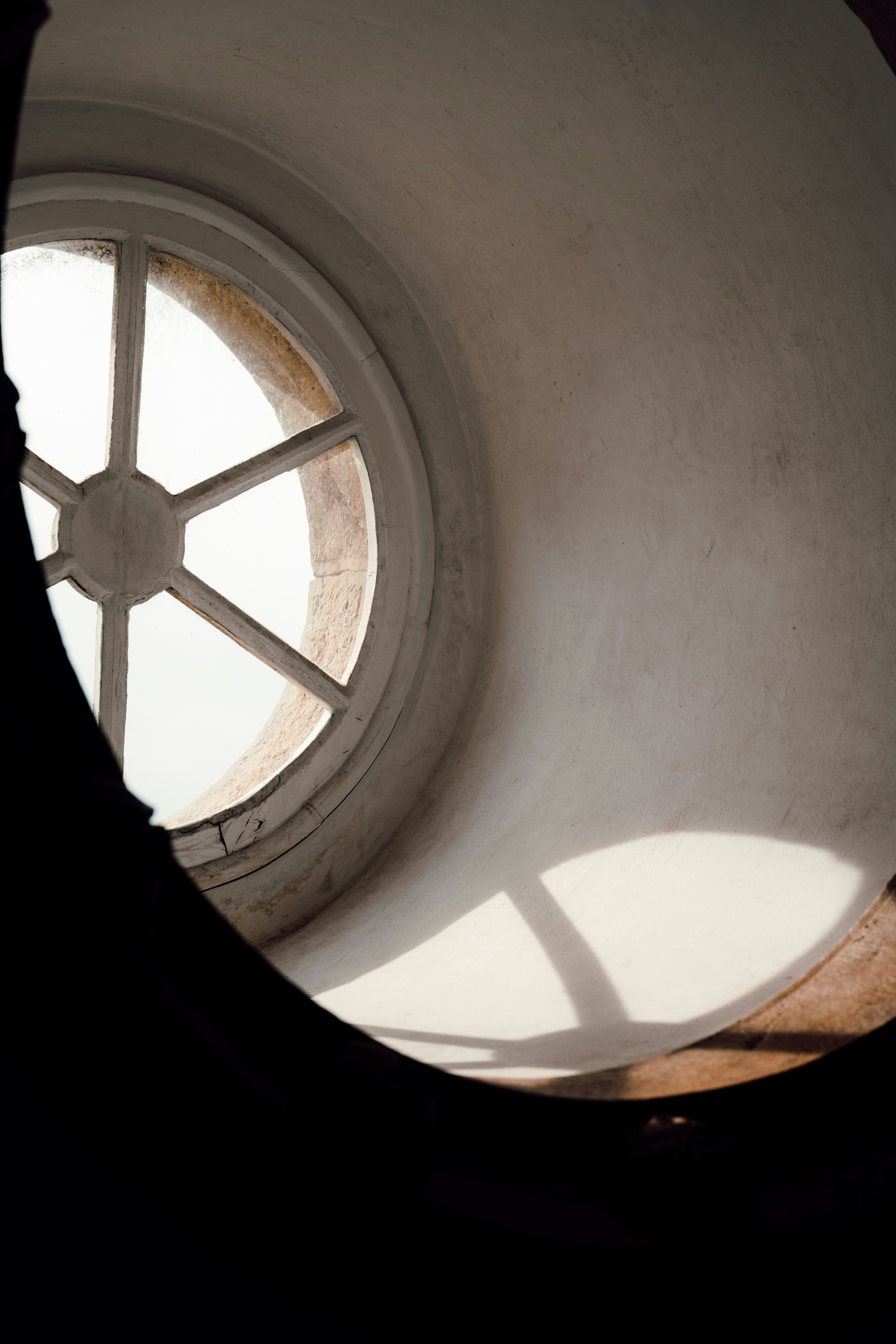 A round window with a circular window pane photo – Free Portugal Image ...