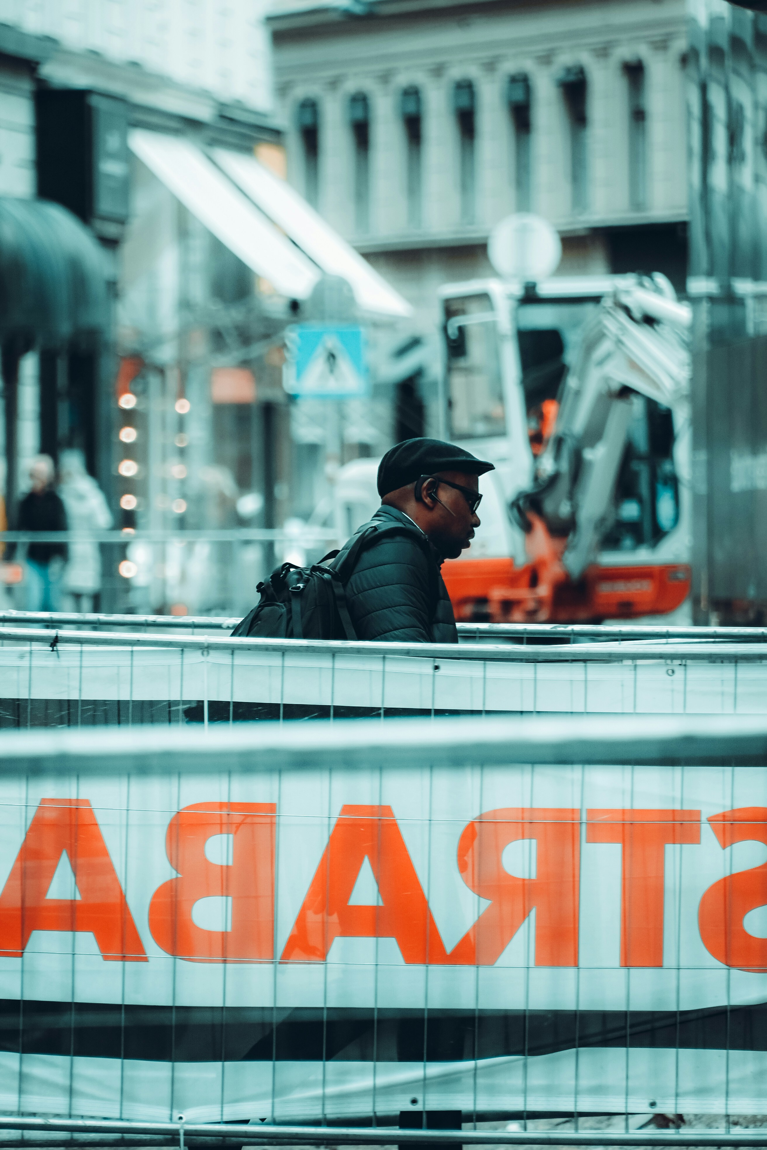 Street Portrait in Motion: APedestrian in a City under Construction