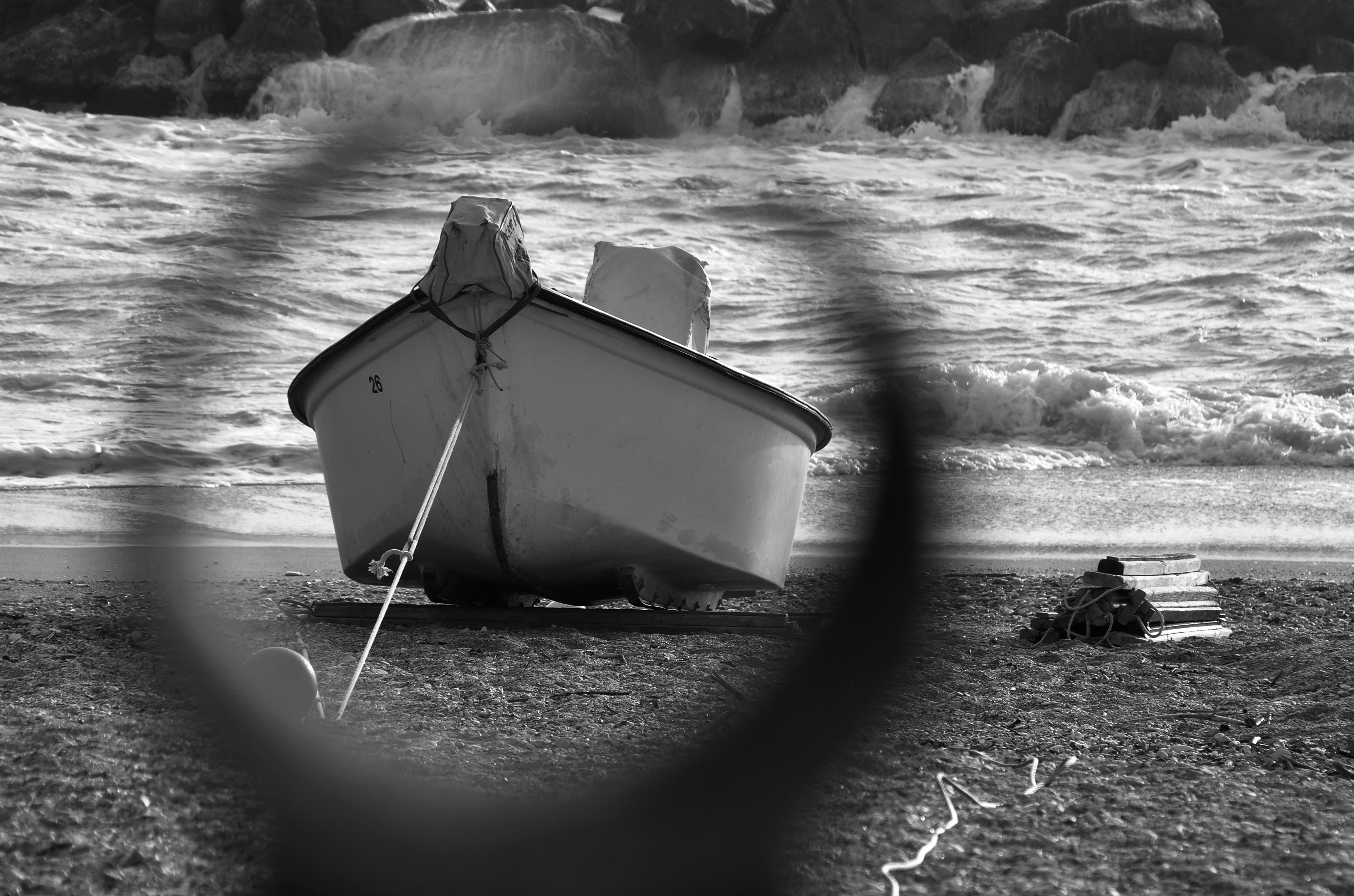Beached Rowboat Framed by a Circular Foreground Ring