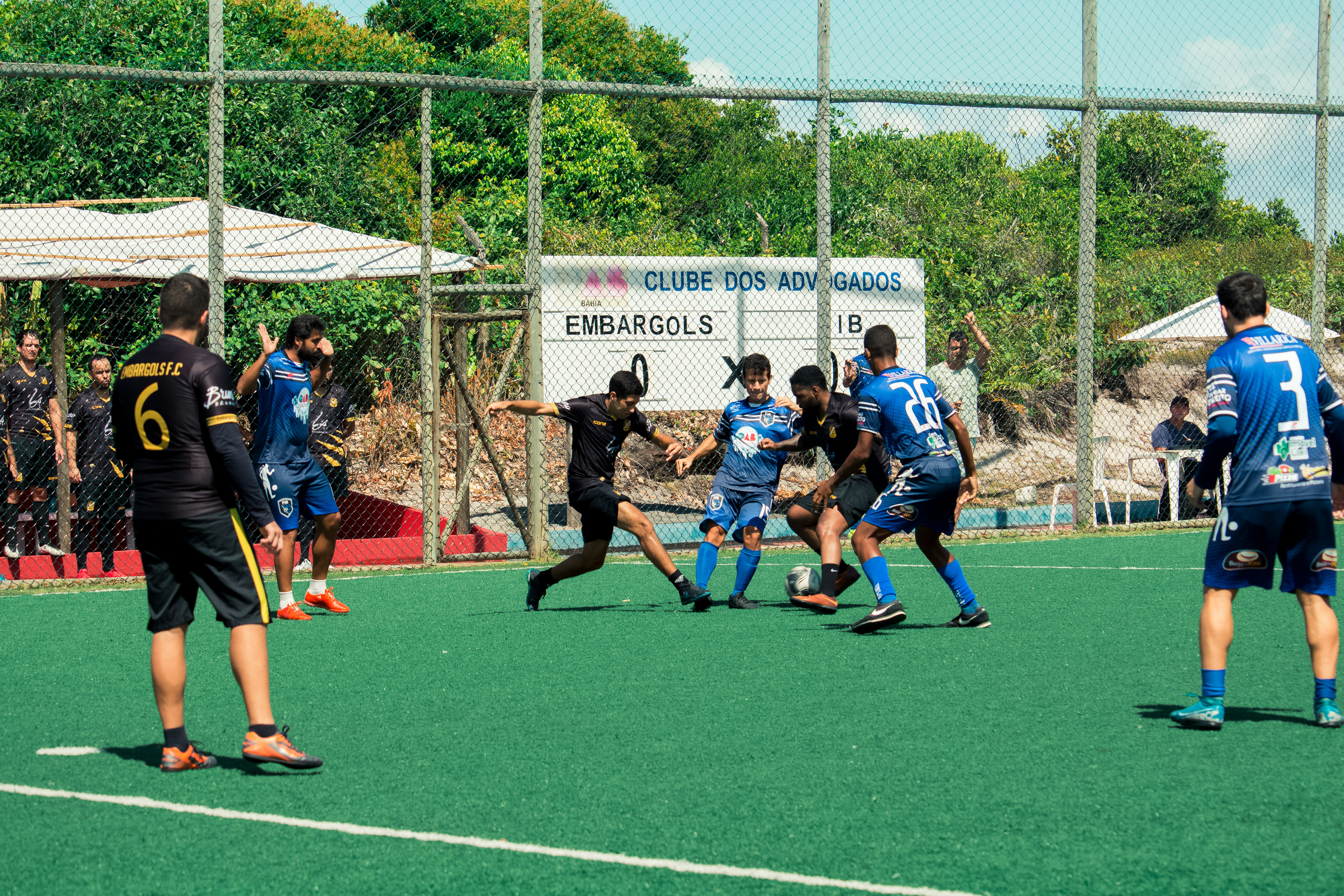 a group of young men playing a game of soccer