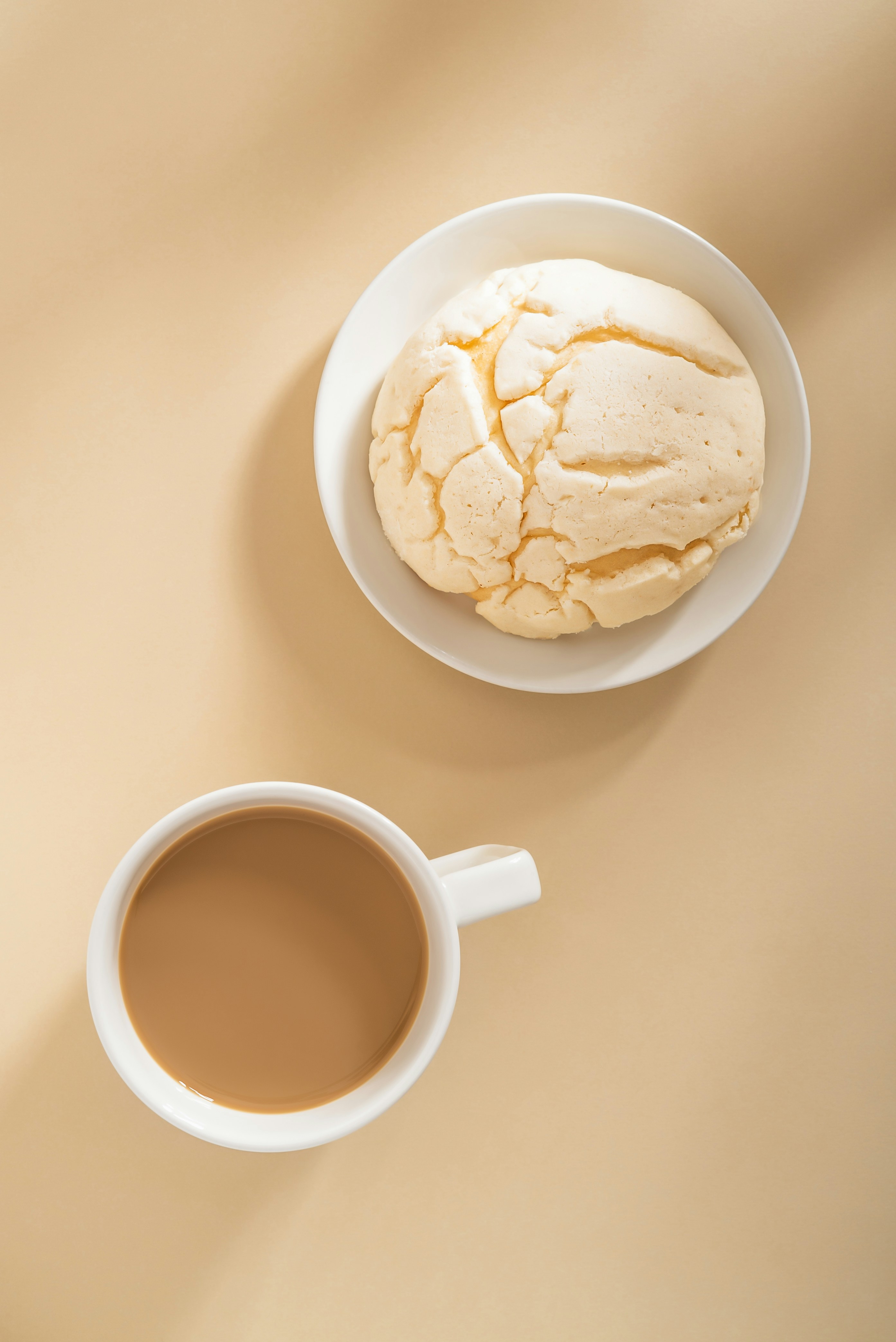 Mexican bread "Concha" and coffee cup 
