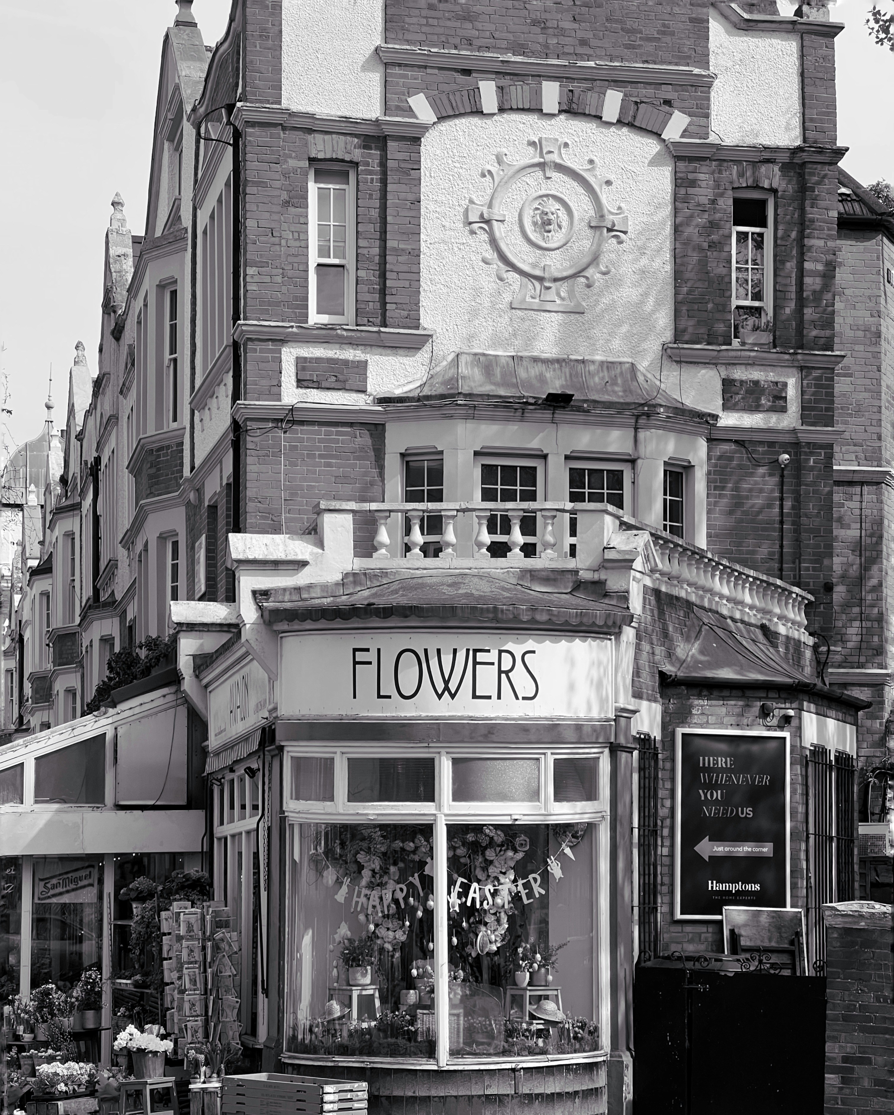 Monochrome Victorian Street Corner: The Flower Shop Window