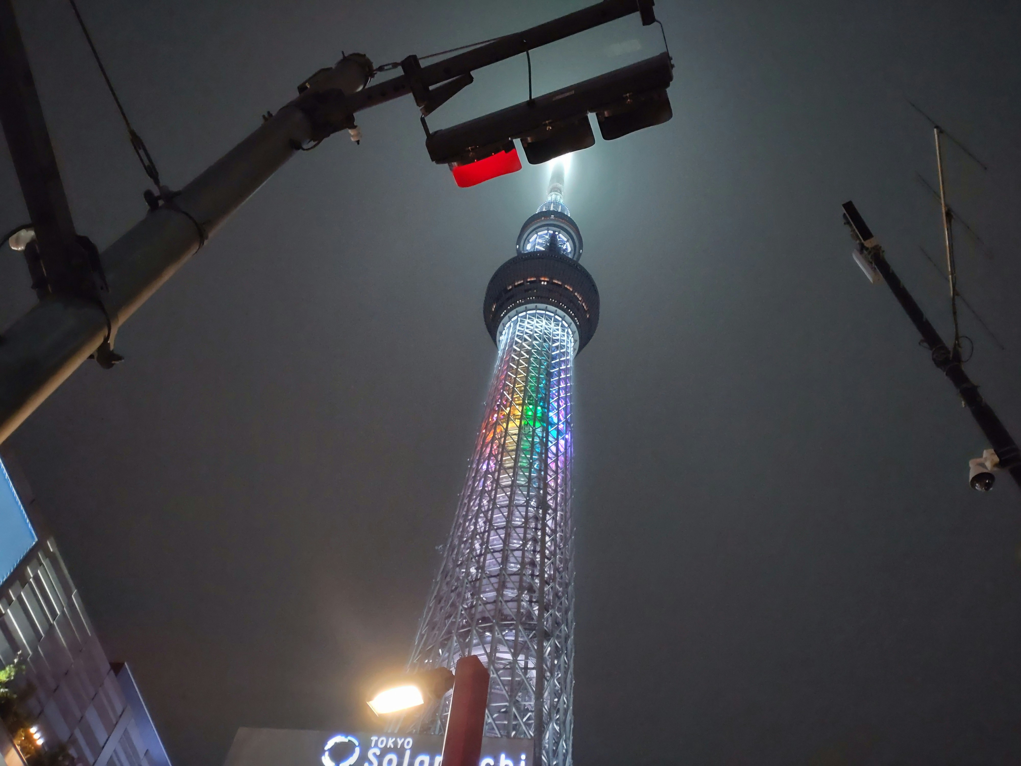 A tall tower with a rainbow light on top of it photo – Free Skytree Image on Unsplash