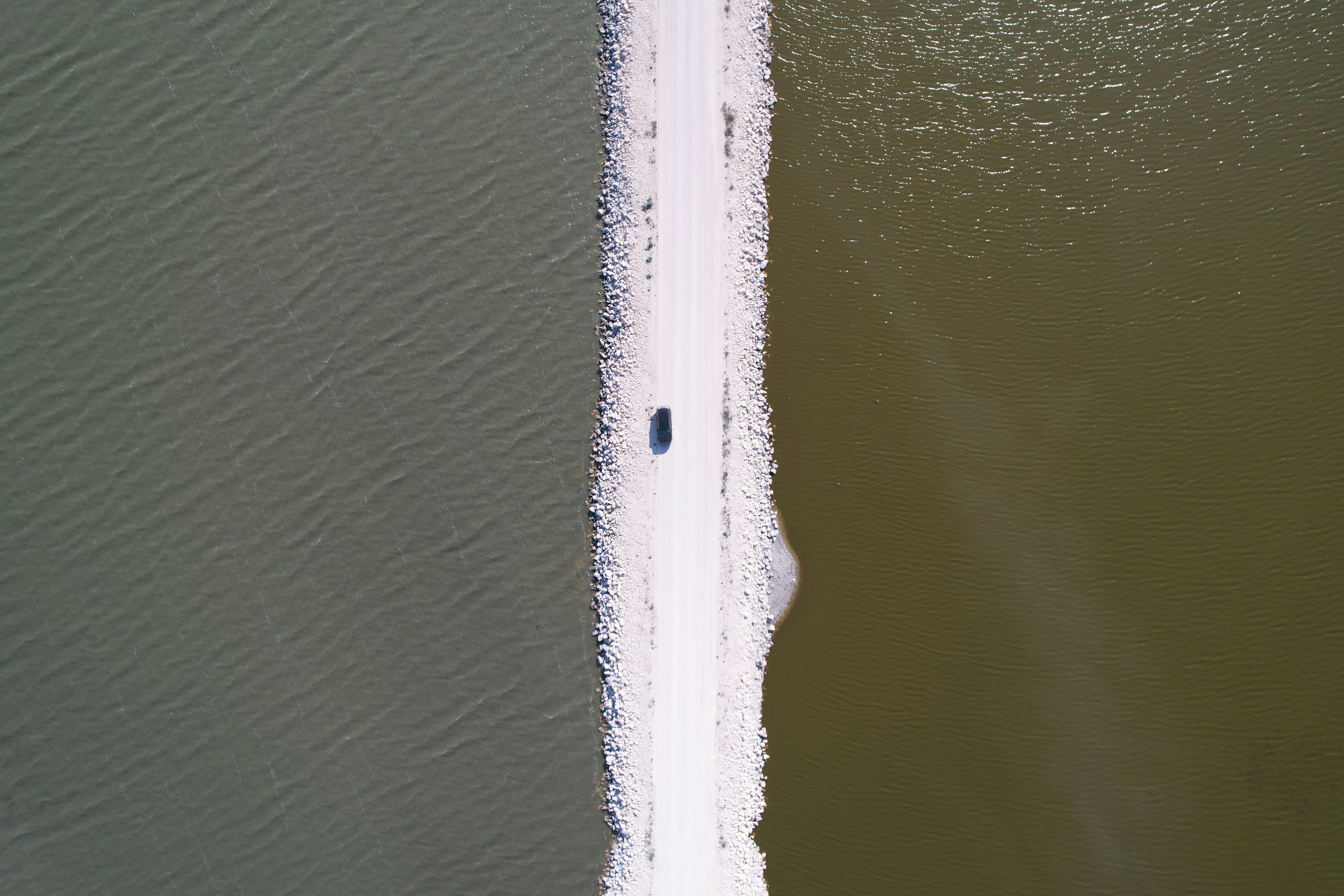 an aerial view of a boat in the water
