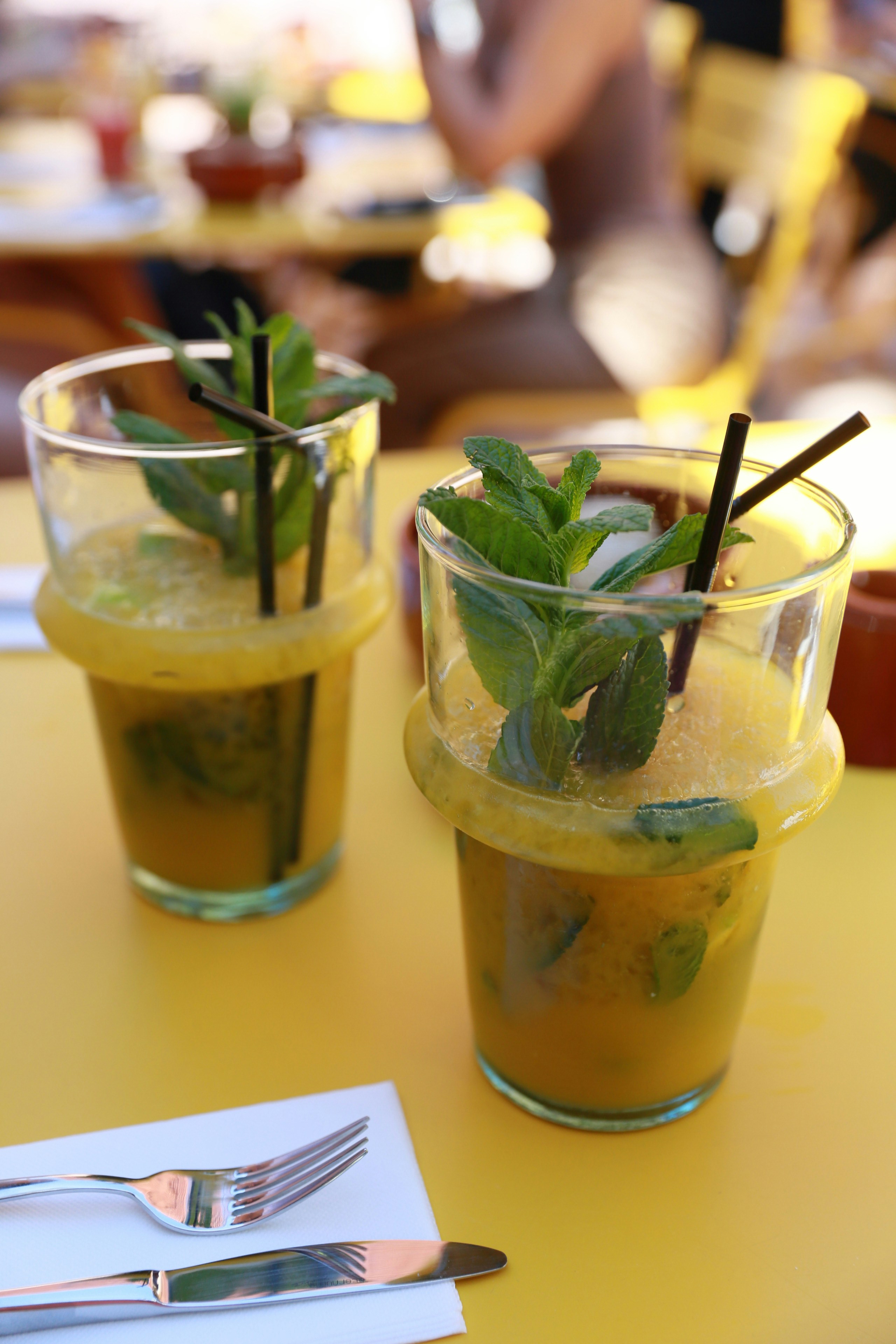 Sun-Kissed Mojitos on a Bright Café Table