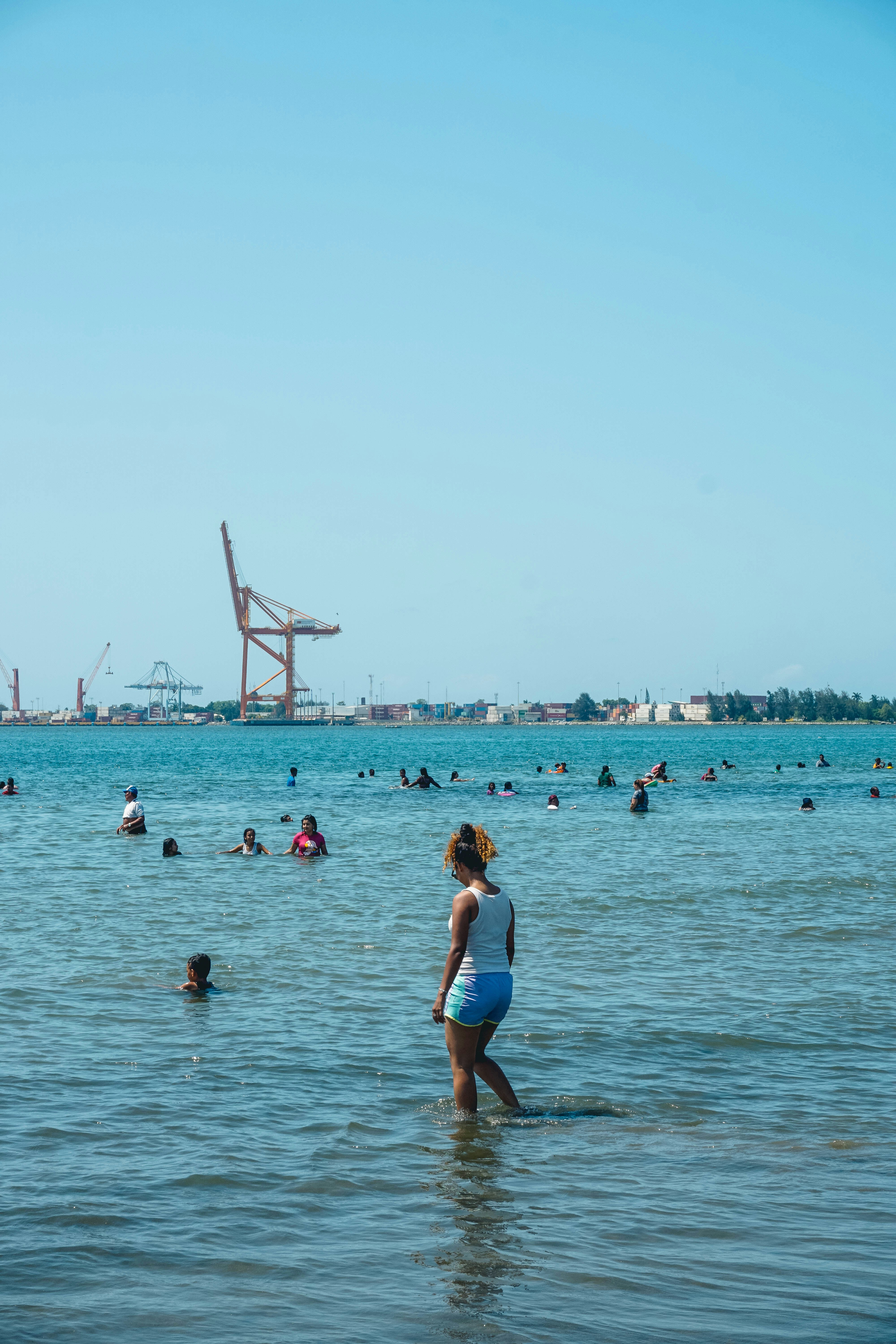 A person standing in water photo – Free Person Image on Unsplash