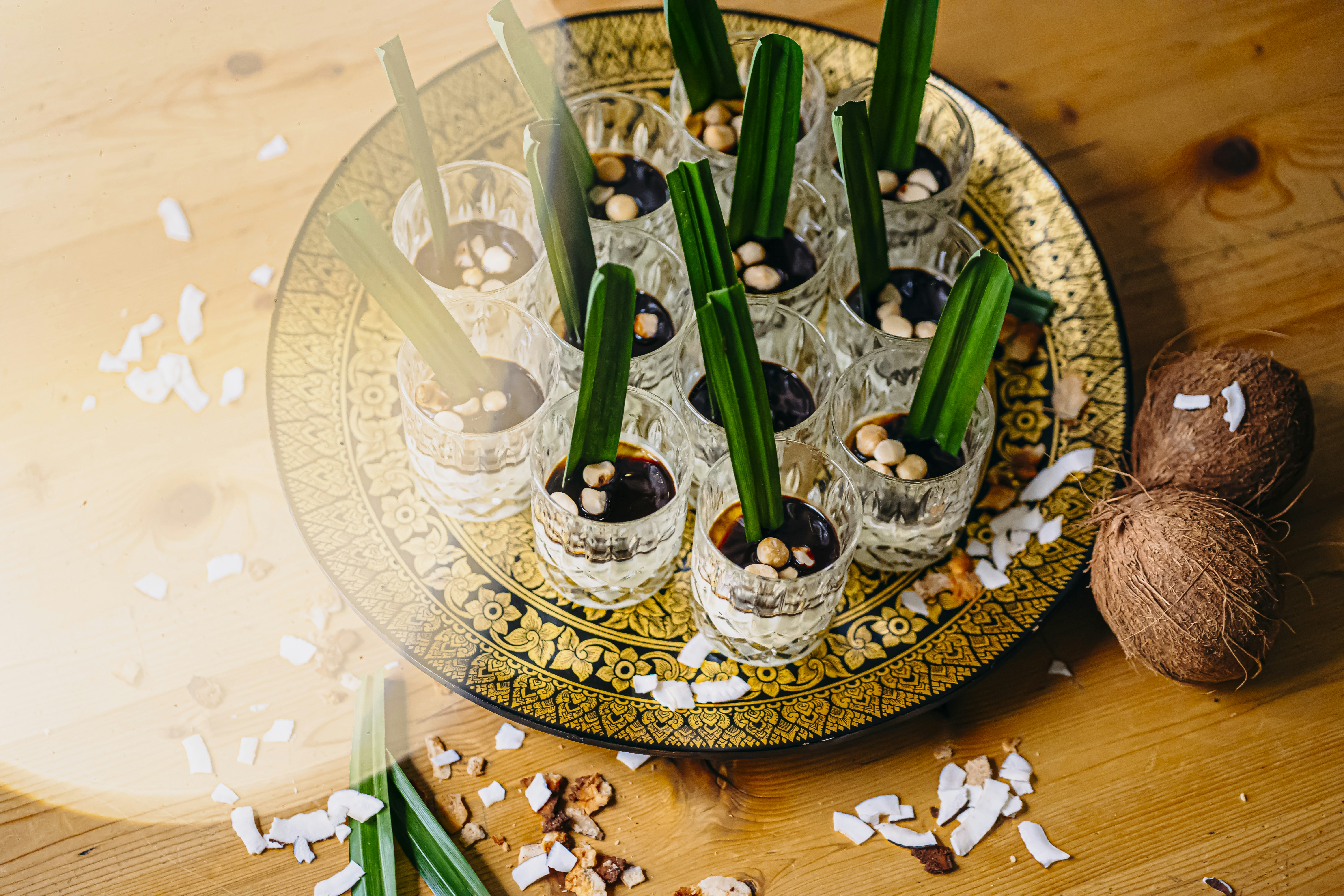 Coconut-Wrapped Treats Crowned on a Golden Plate