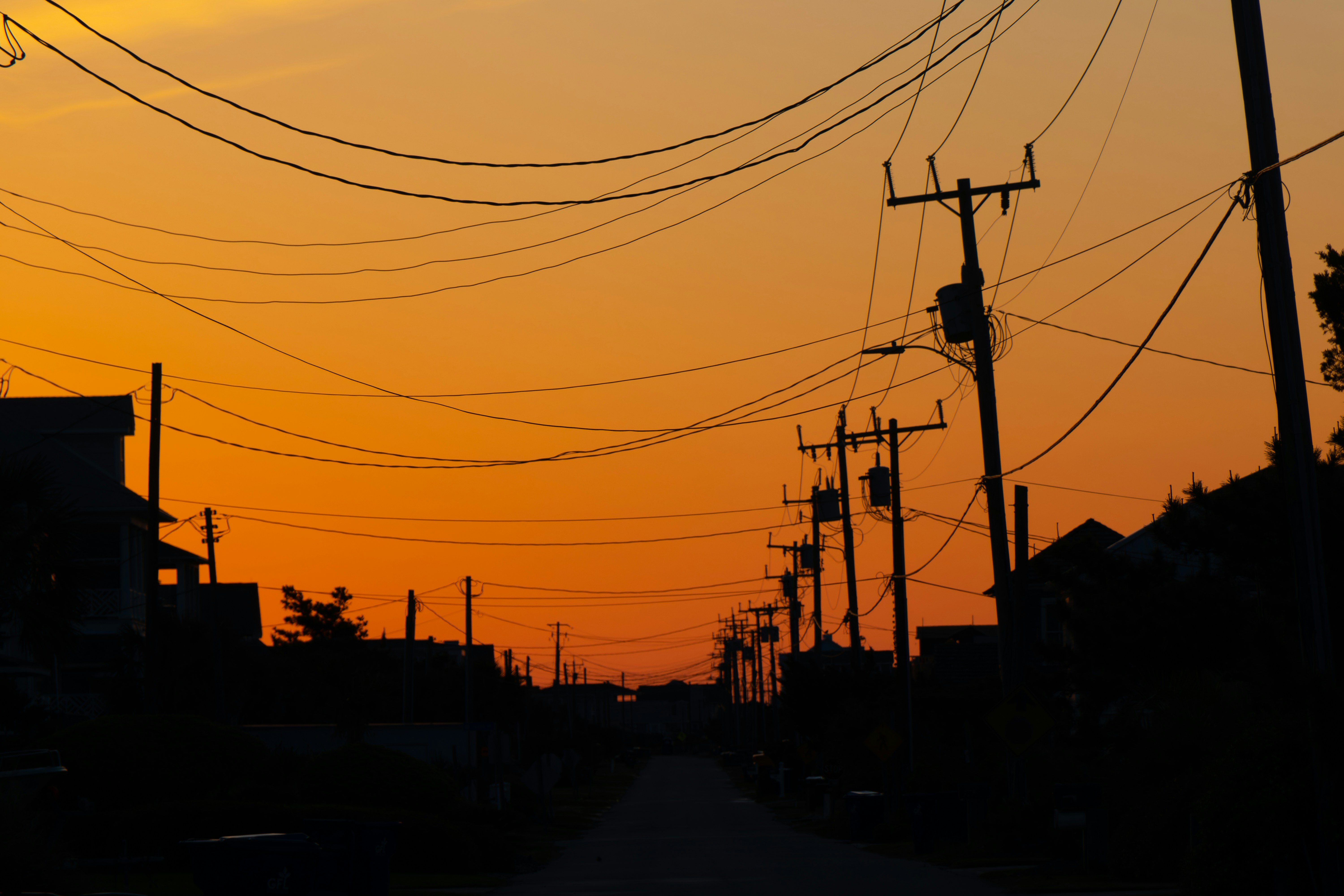 Dusk Convergence: Silhouettes Along a Quiet Street