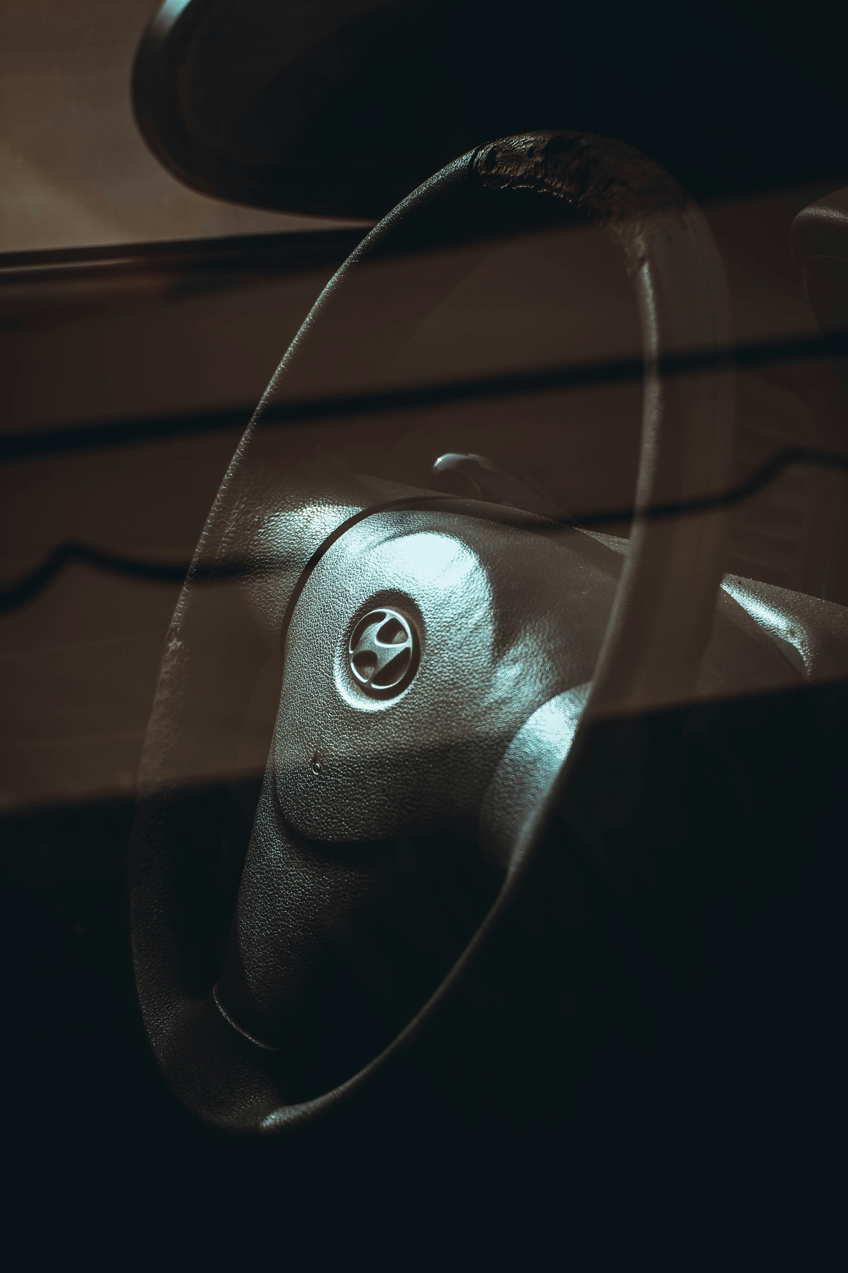 Shadowed Core: Close-Up of a Toyota Steering Wheel