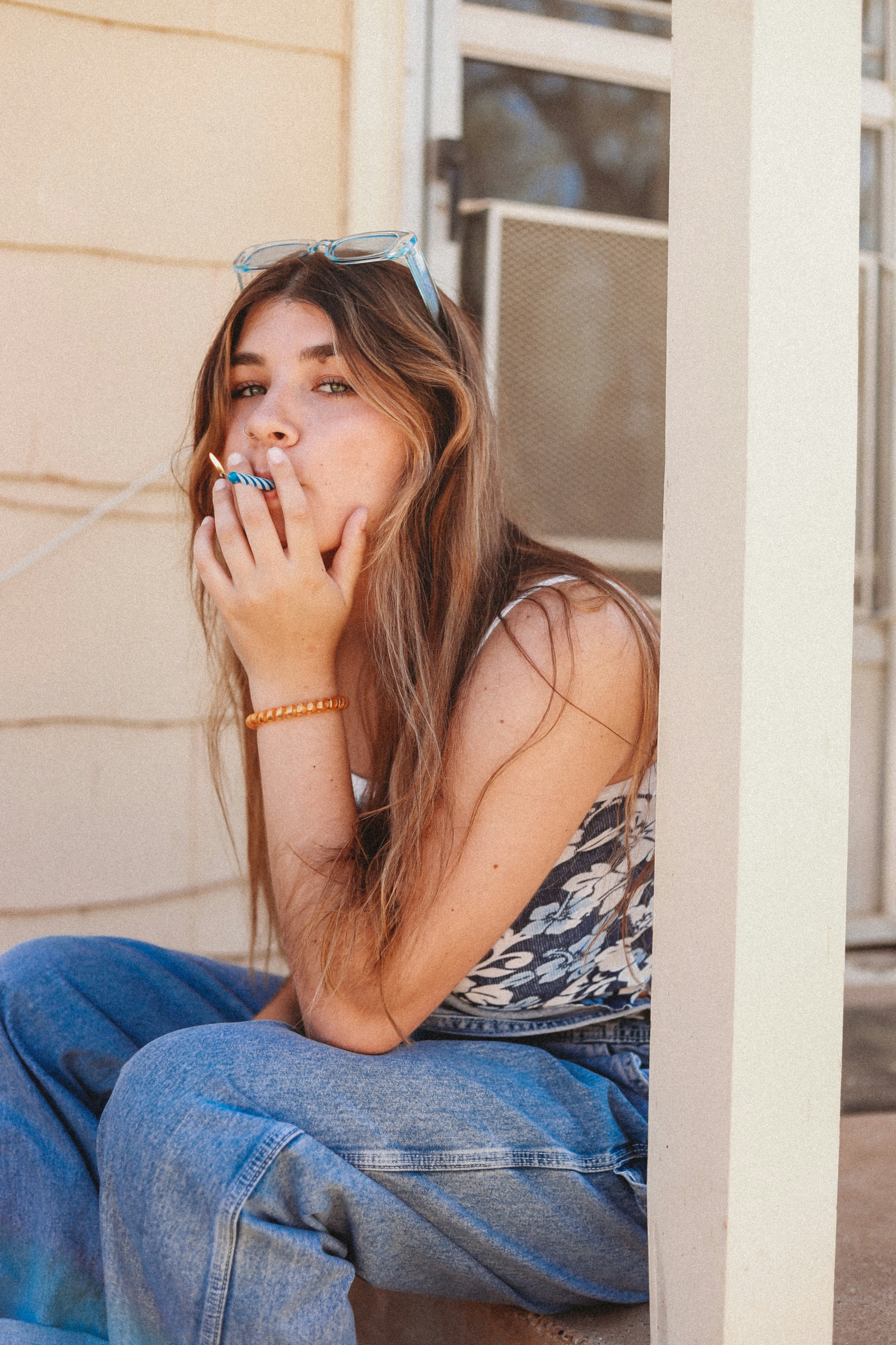 Candid Smoky Glow: A Quiet Moment on the Porch