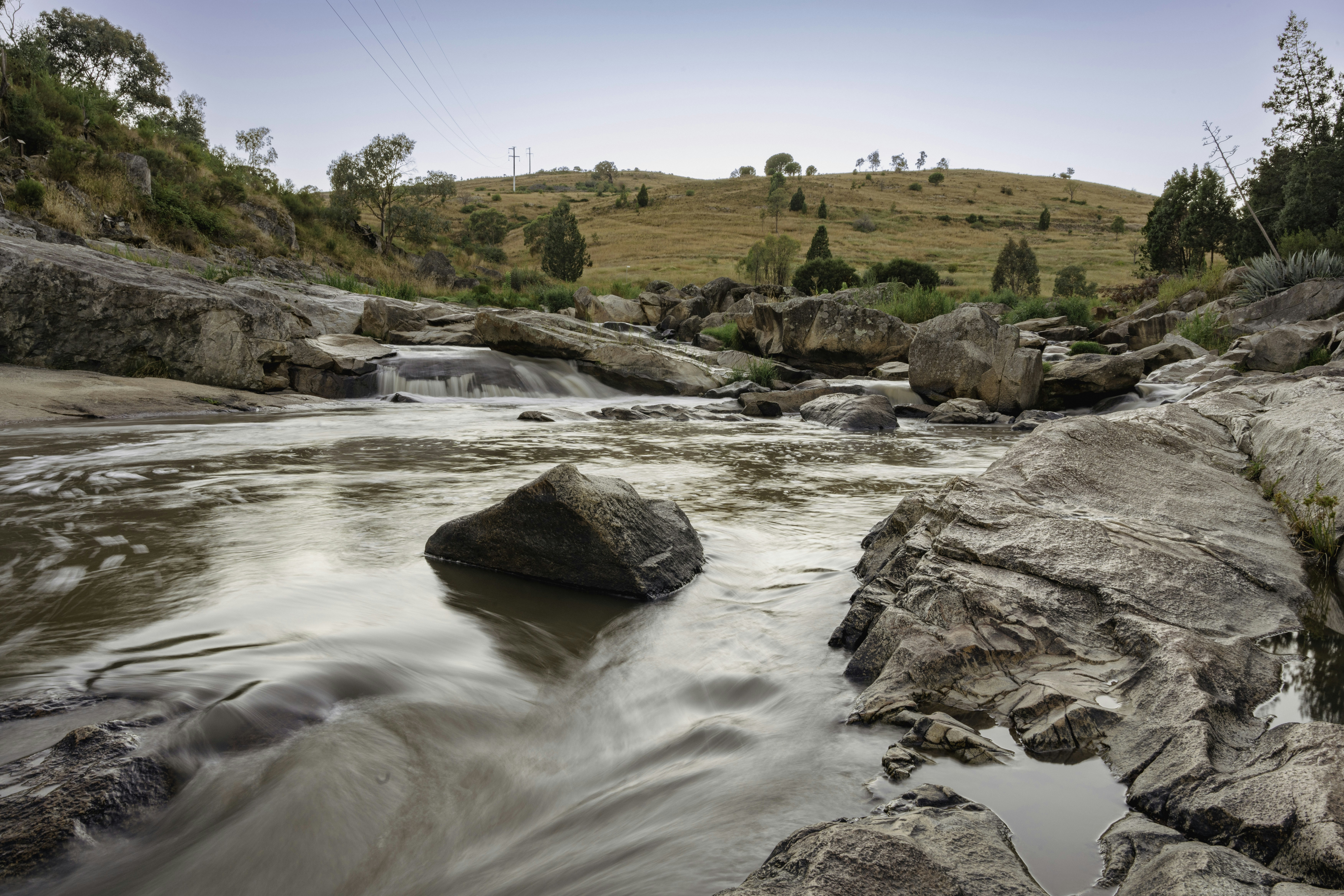 A river with rocks and trees photo – Free Adelong falls road Image on ...