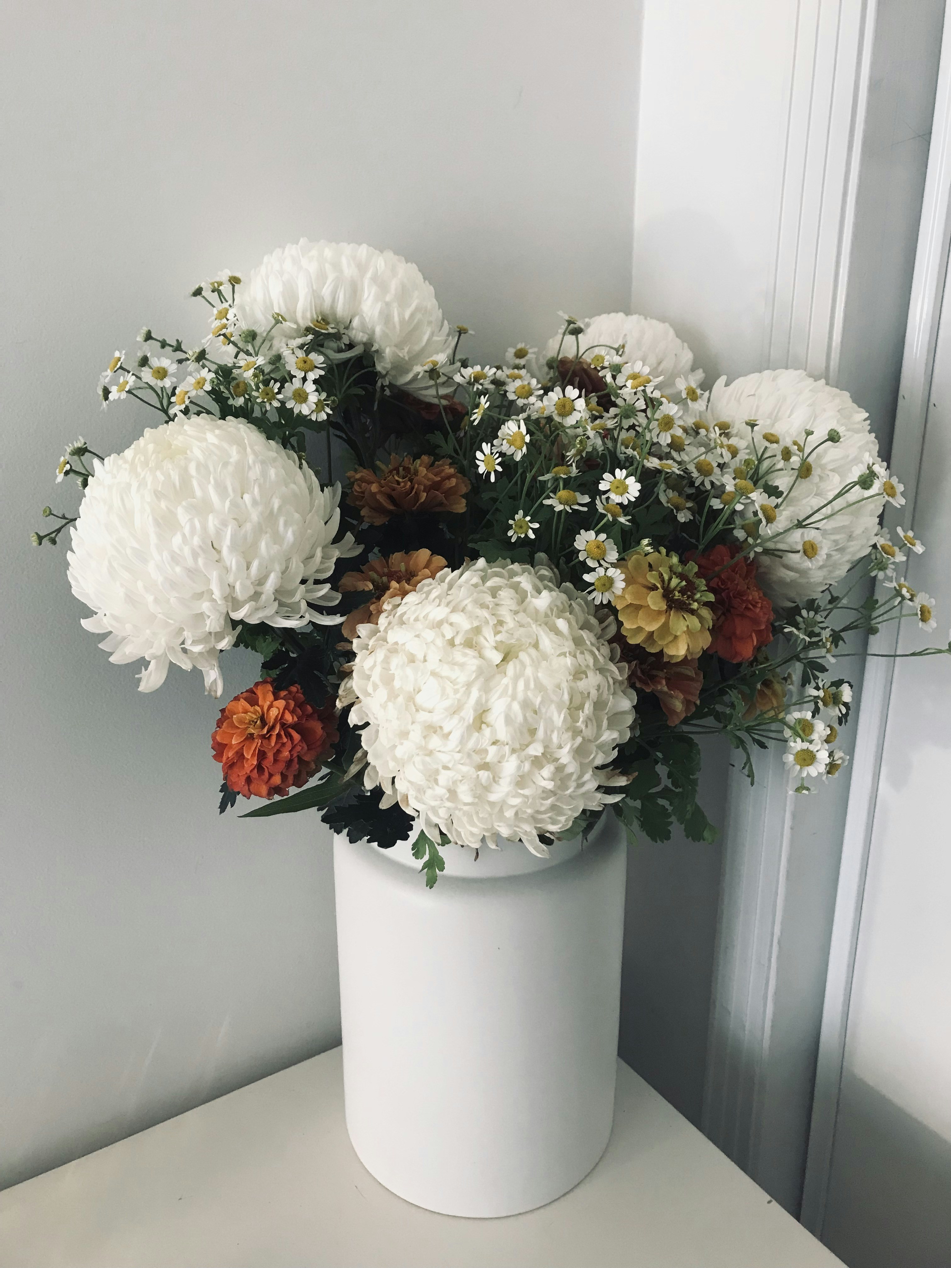 Soft Morning Light on a White Chrysanthemum Bouquet in a Minimal Vase