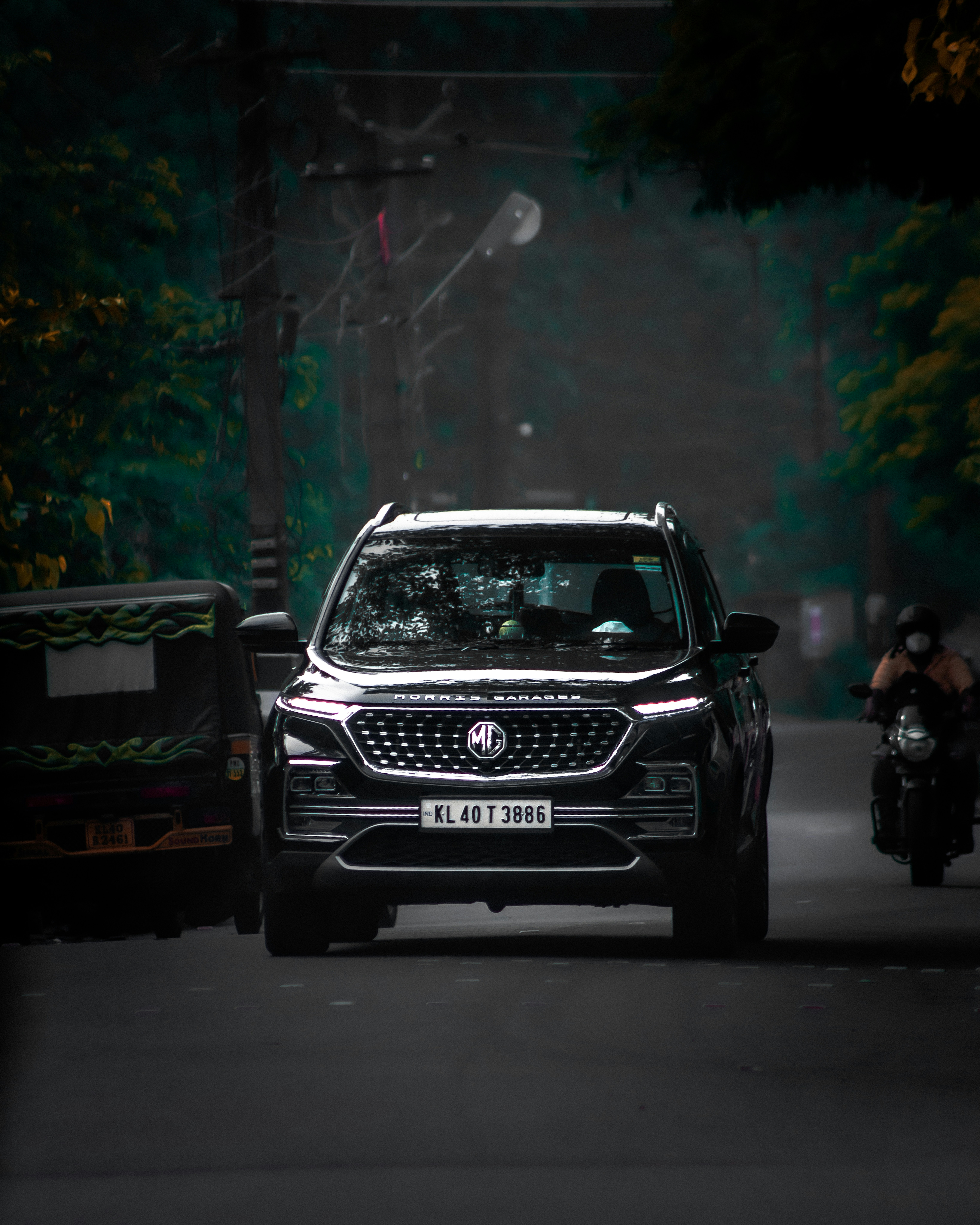 Front-and-Center MG SUV Anchors a Quiet Urban Street at Dusk