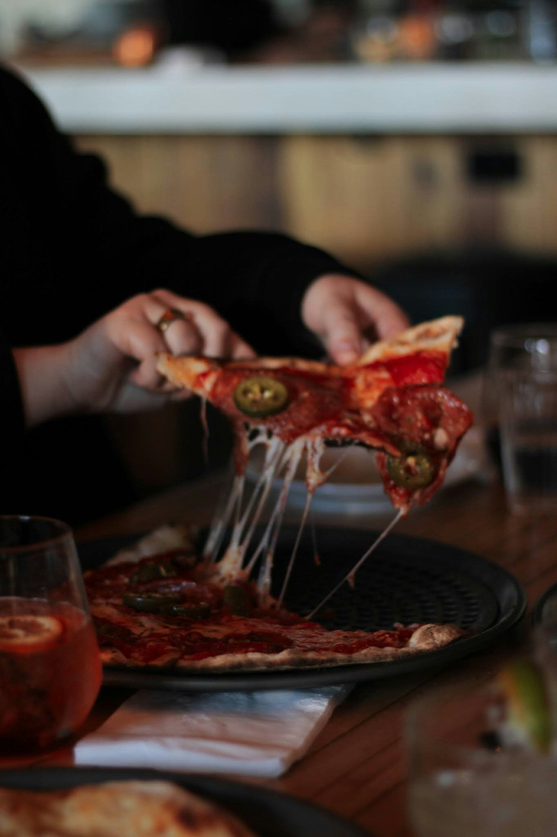 a person eating a pizza