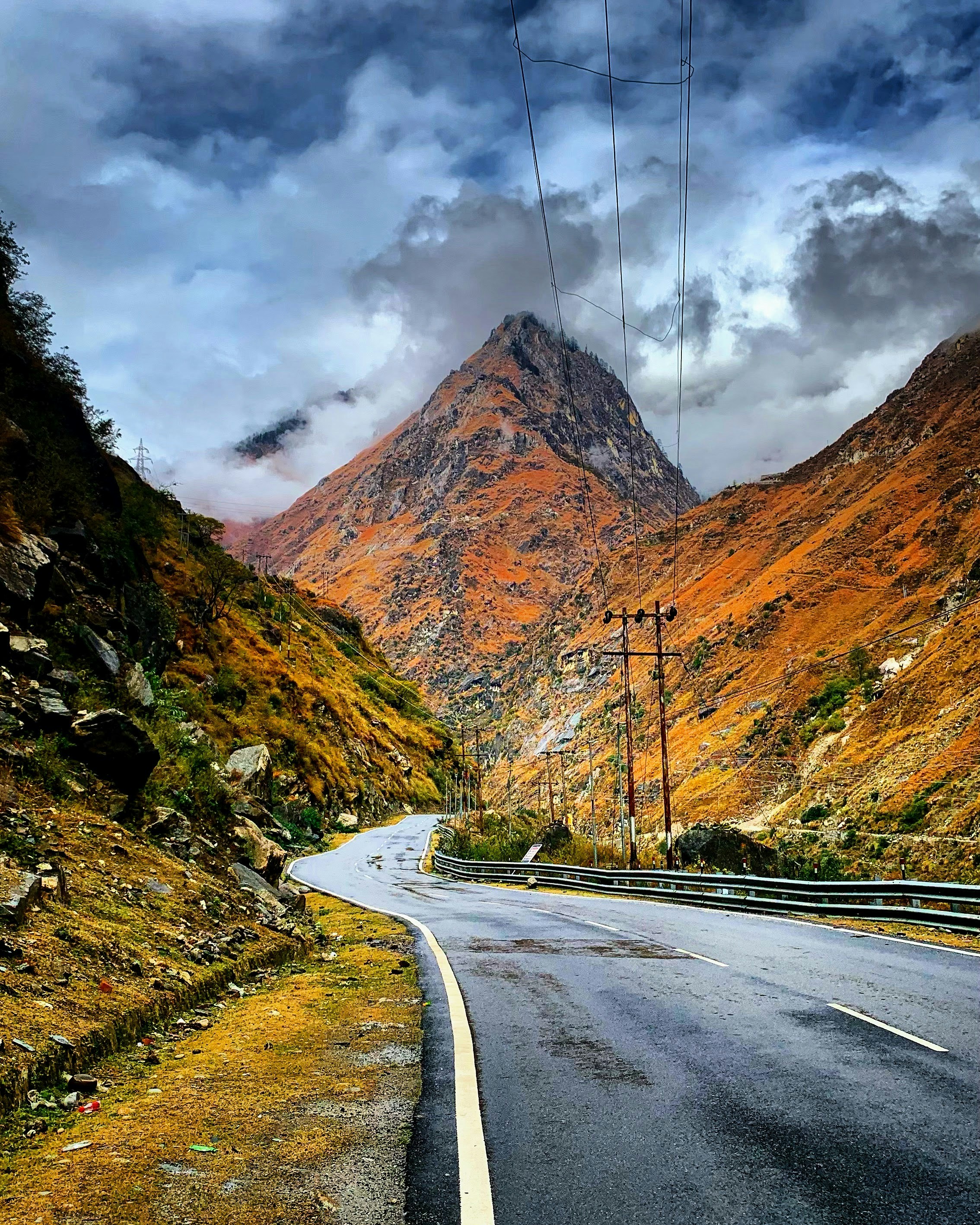 Ember Peak Over the Winding Mountain Pass