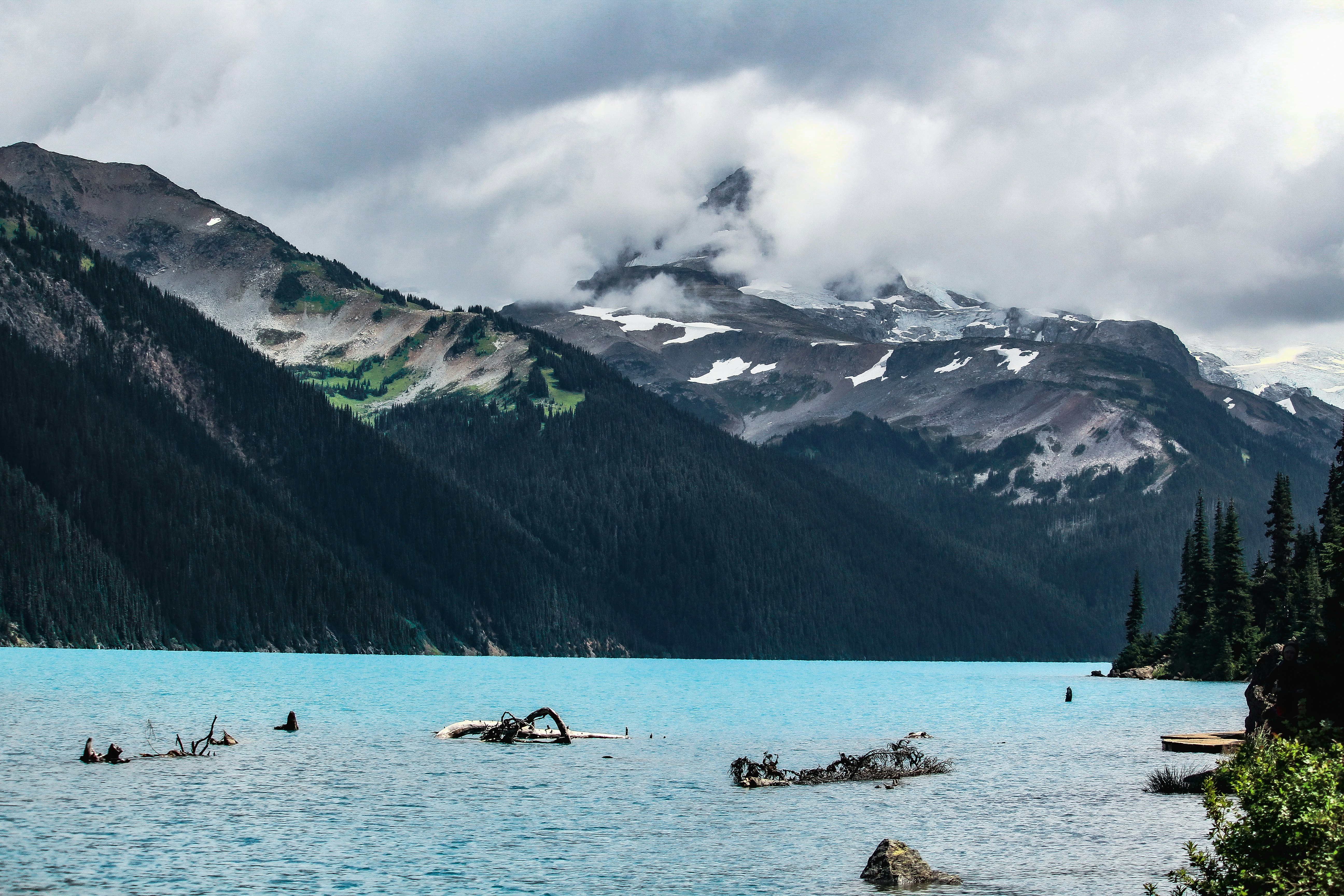 Azure Lake Amid Snow-dusted Range