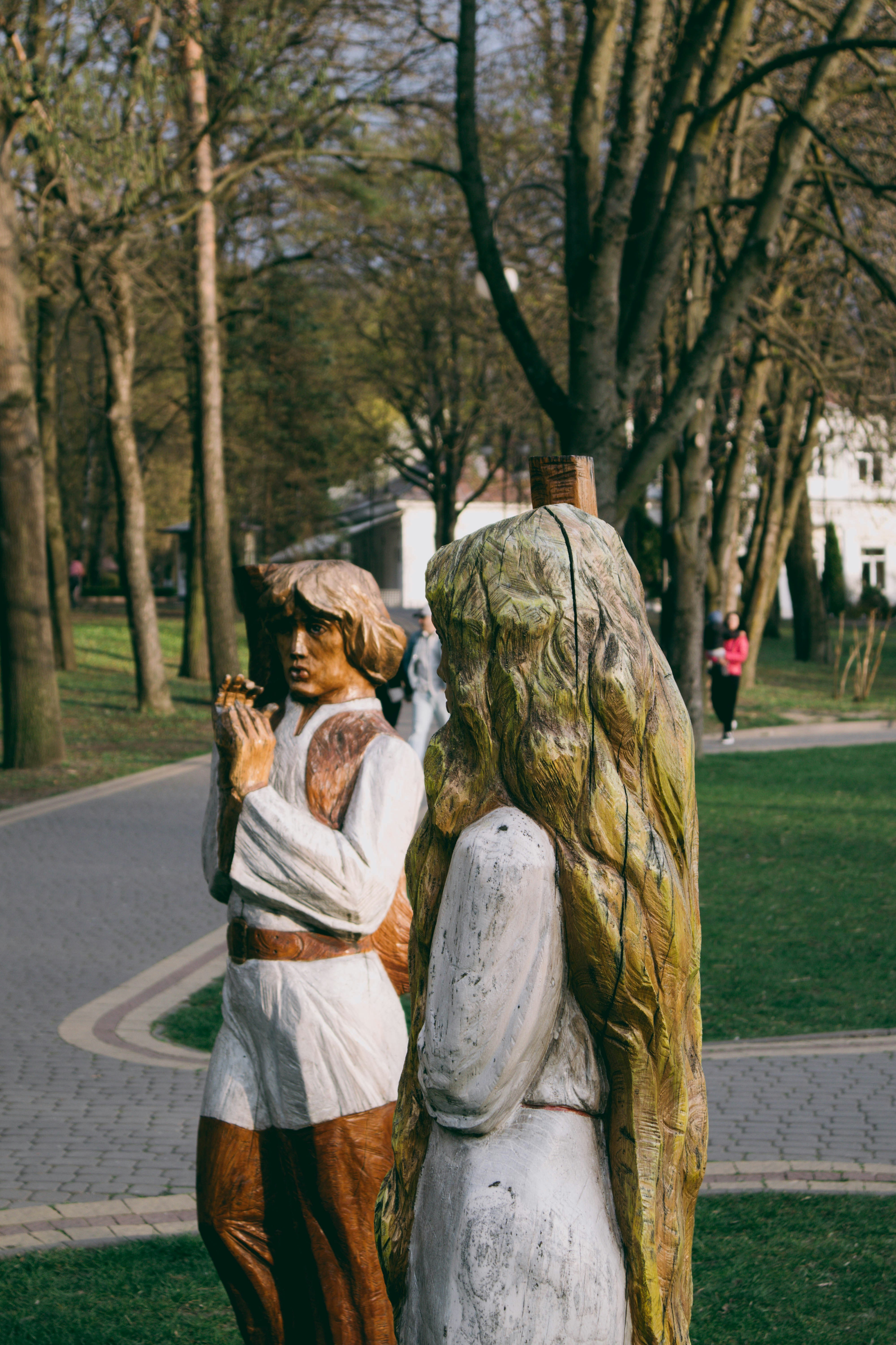 a person holding a statue