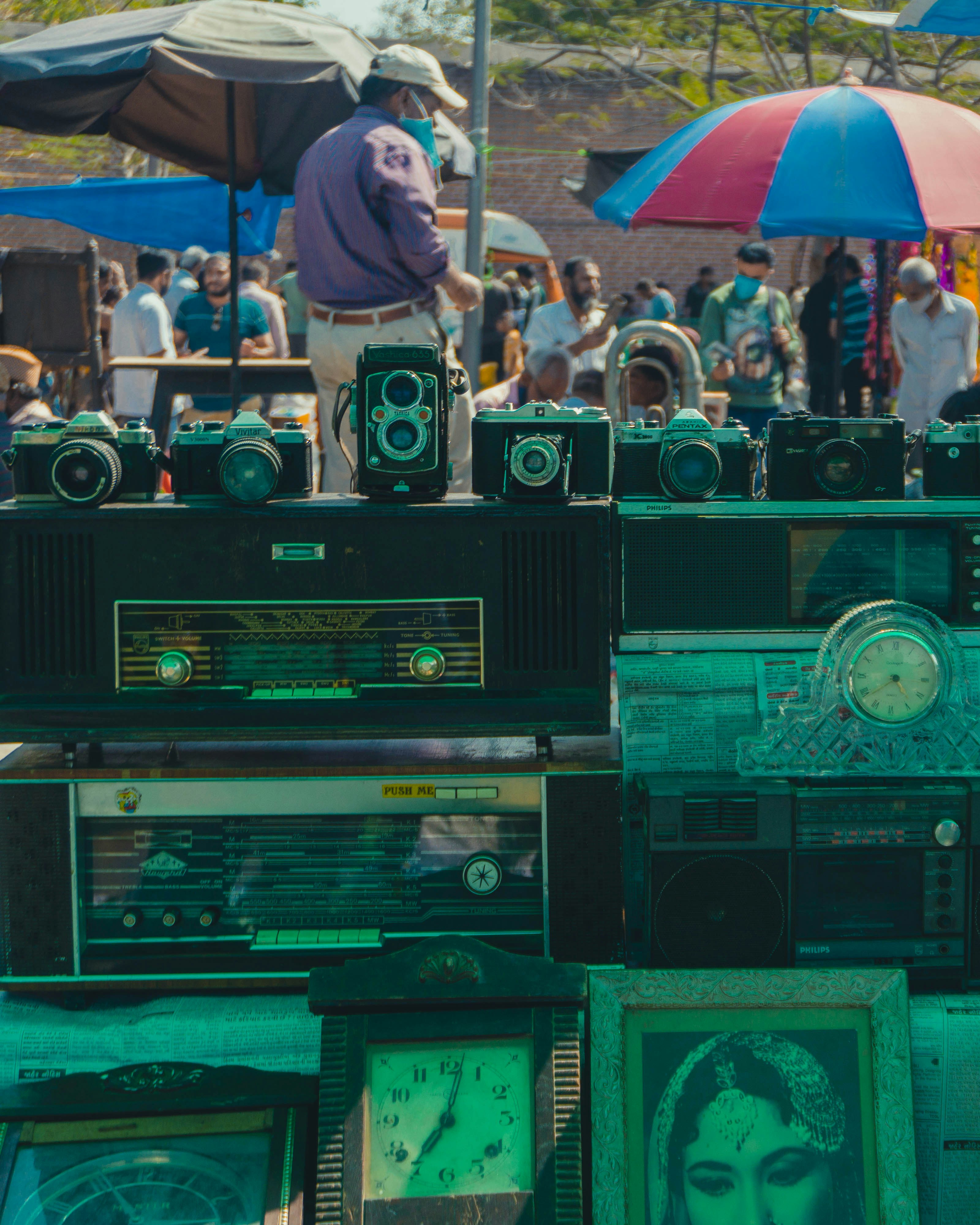 Vintage Camera Bazaar under Colorful Umbrellas