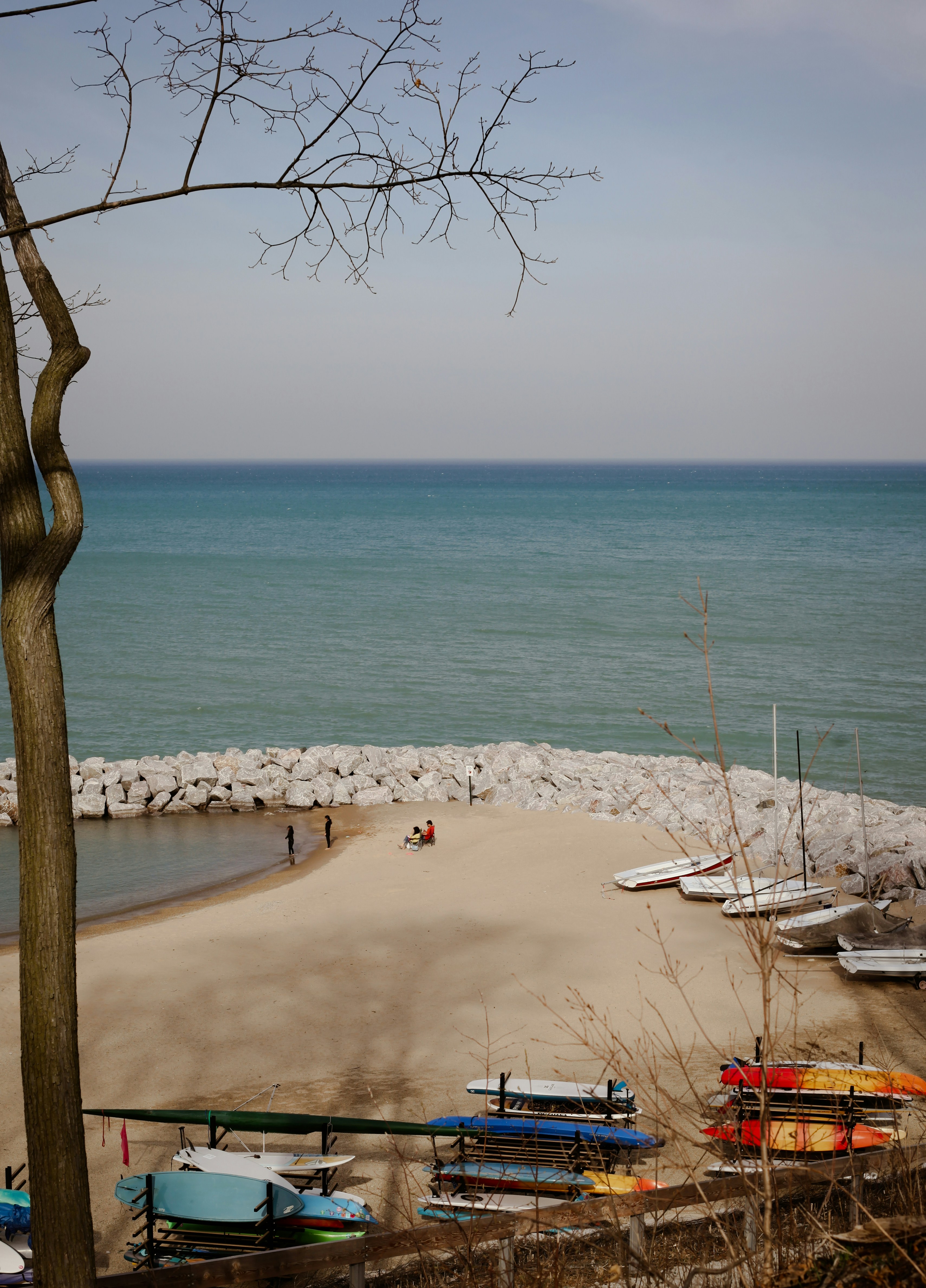 Harbor of Quiet Color: Boats Rest Along a Sunlit Beach