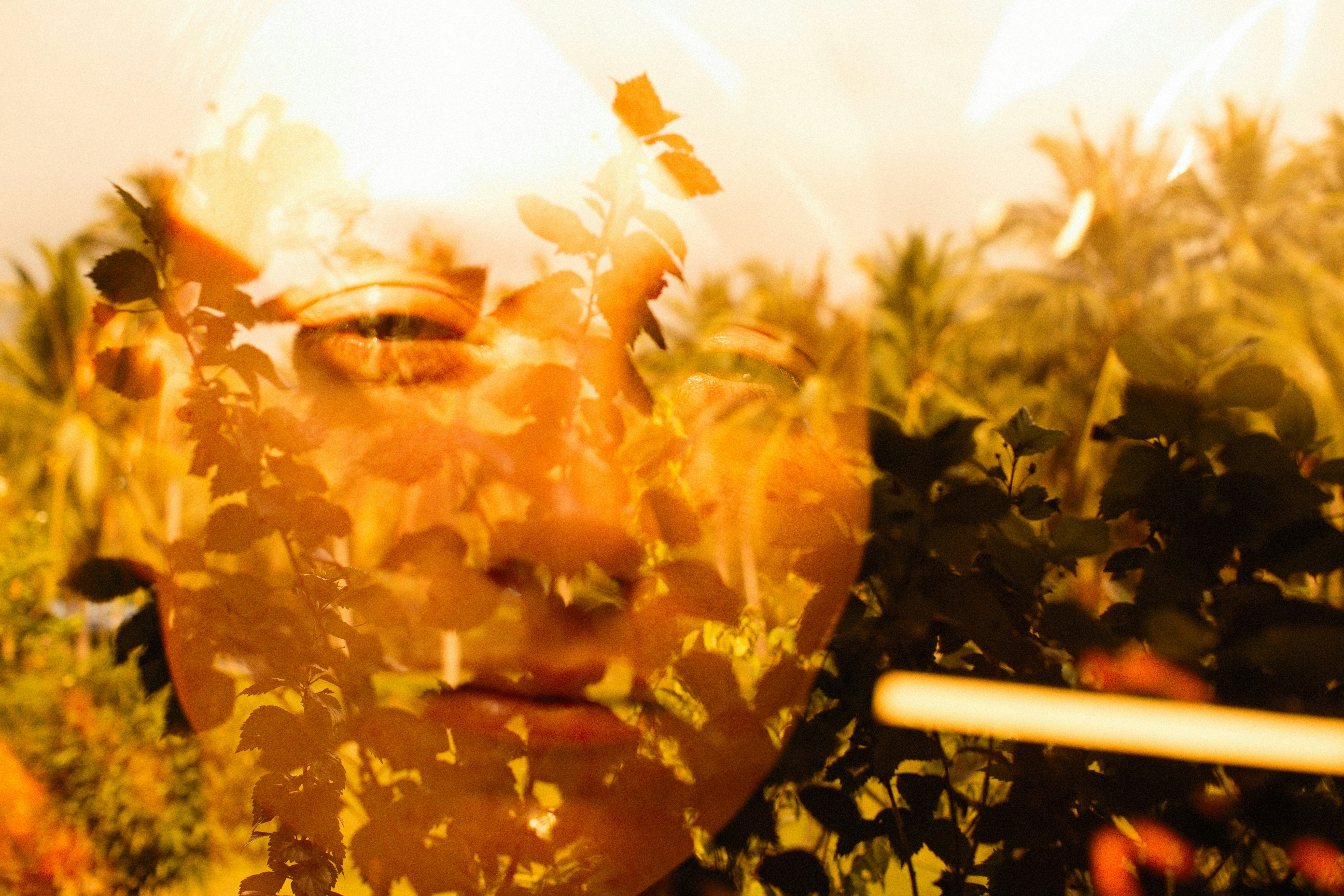 A close up of a person's face photo – Free Orange Image on Unsplash
