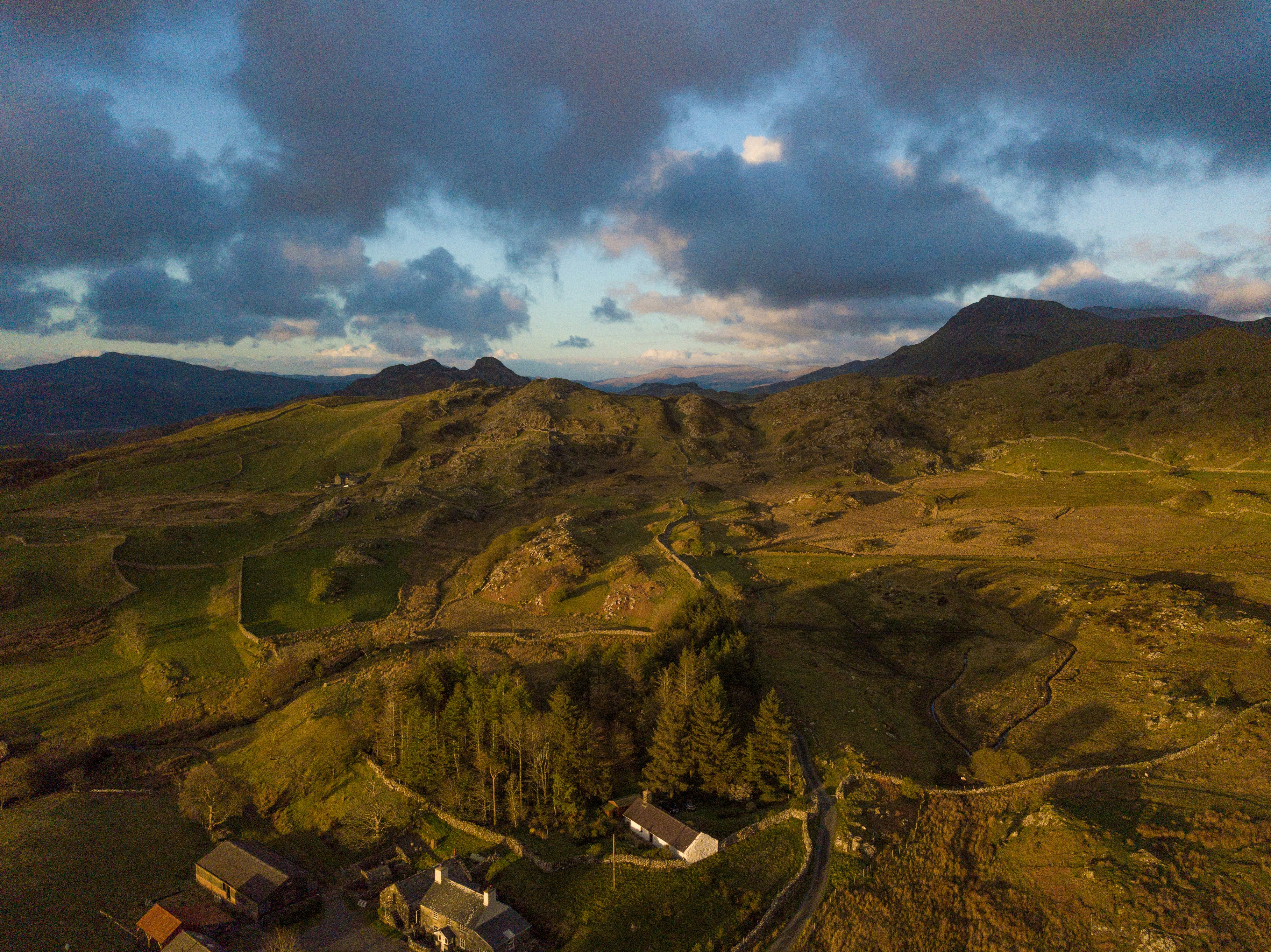 Terraced Hillside Village at Golden Hour Over a Sculpted Landscape