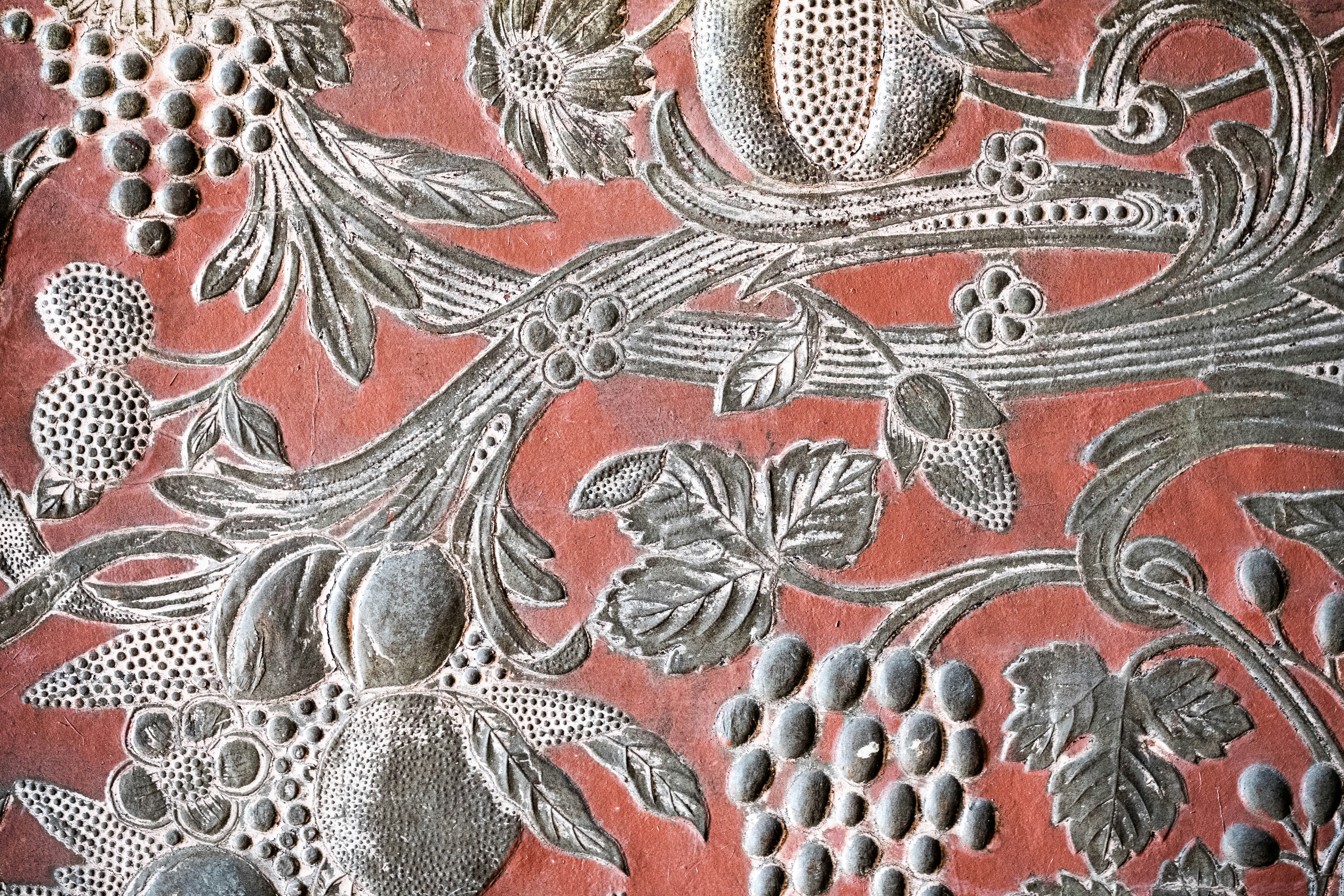 Ornate Botanical Relief on Terracotta