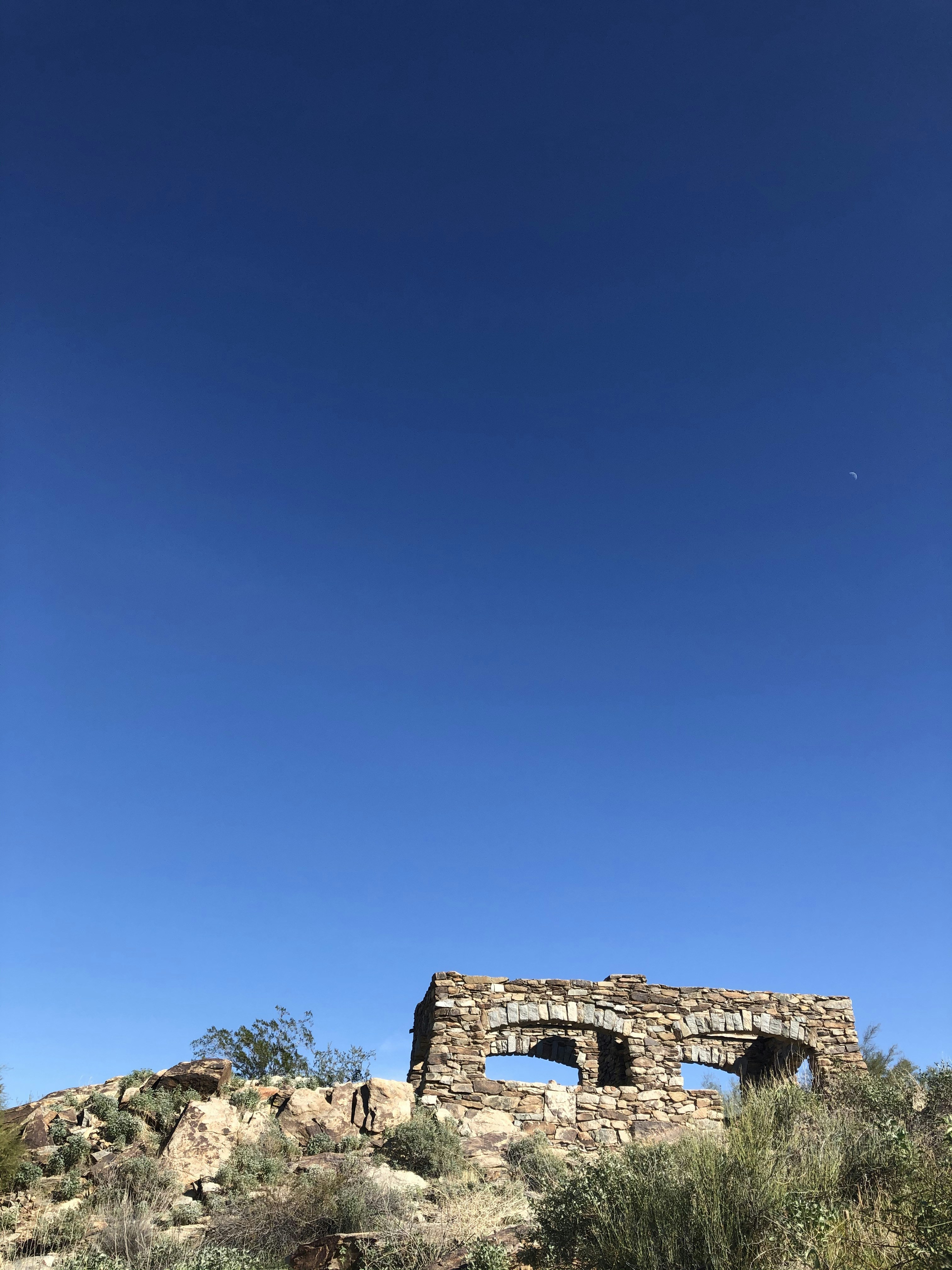 Remnant Stone Wall Framed by an Expansive Cerulean Sky