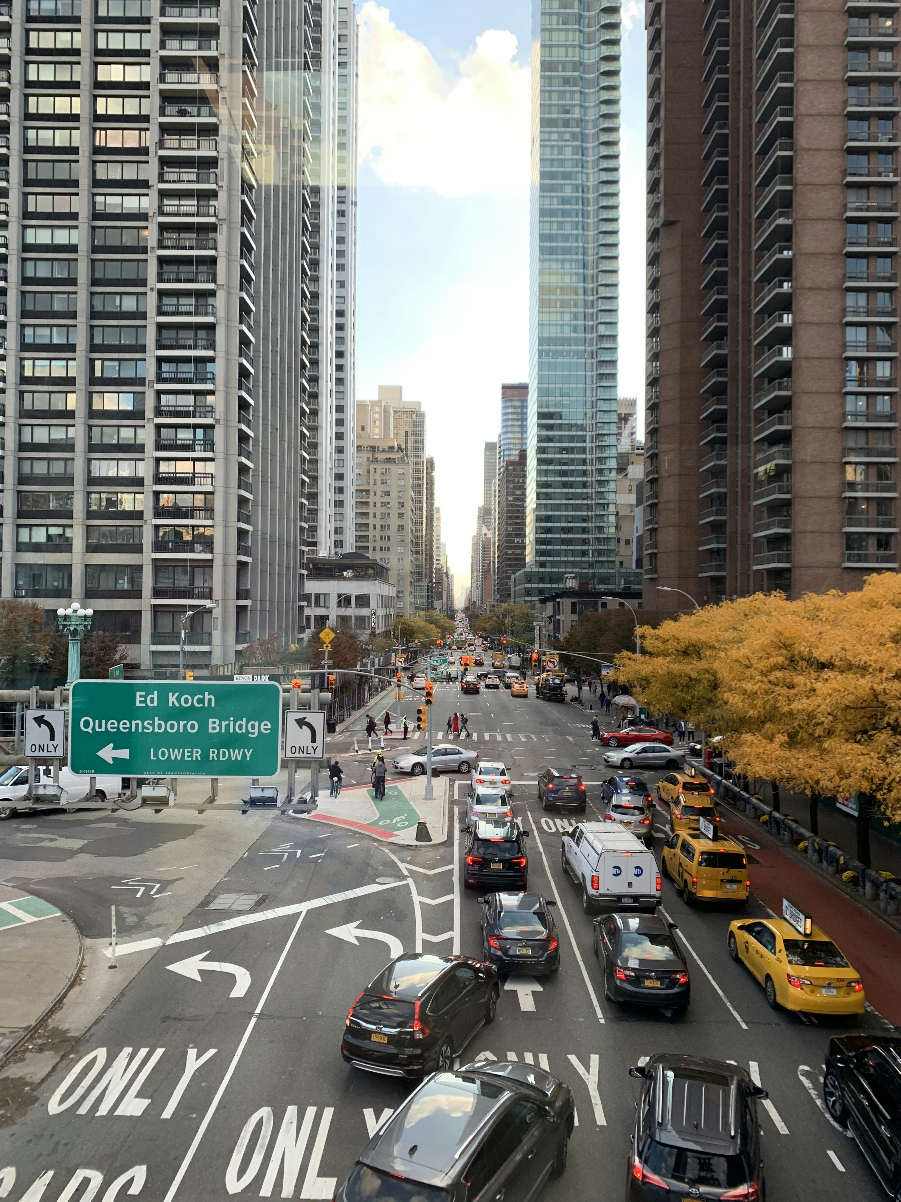 Convergence Point on a City Street: Traffic Between Skyscrapers