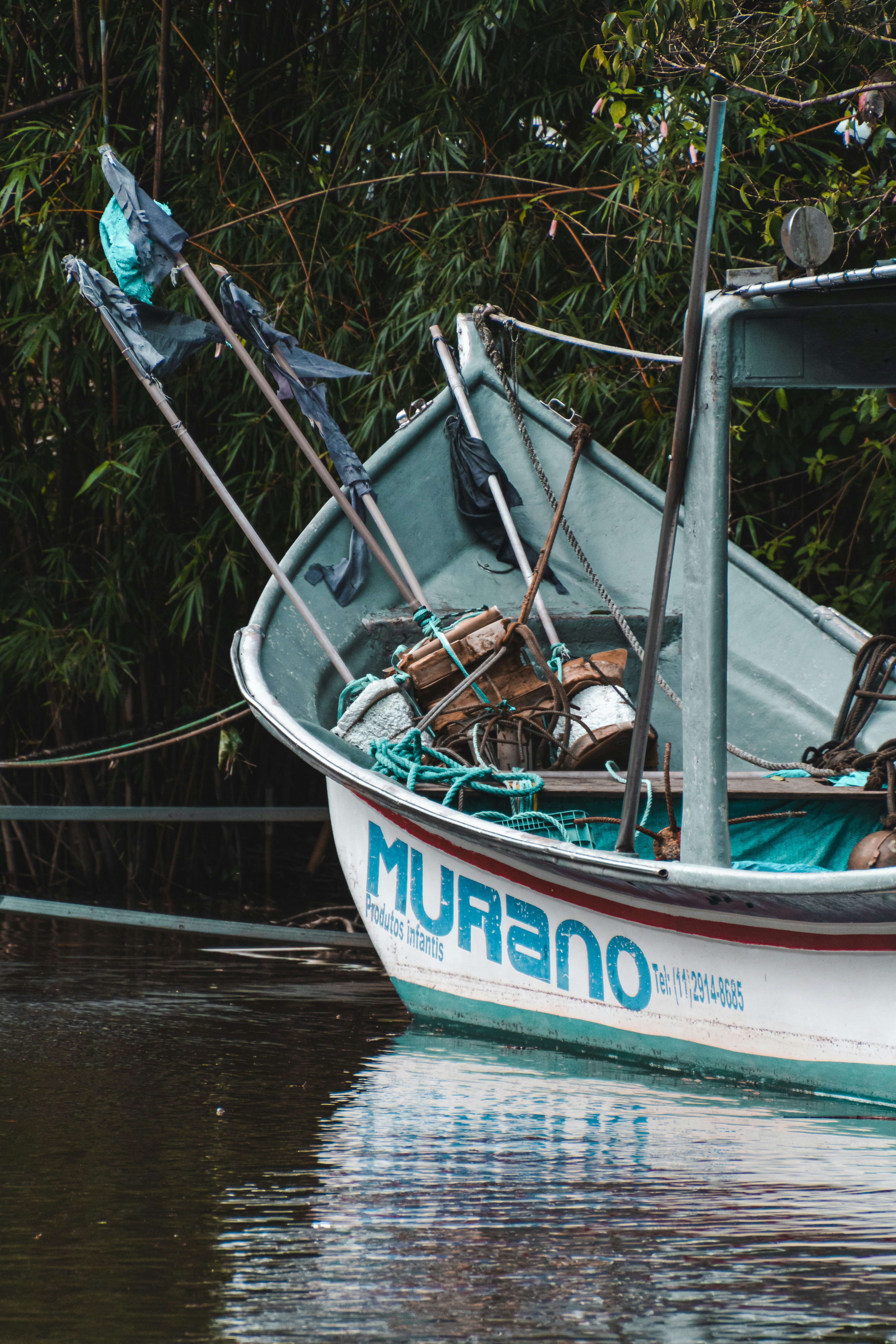Murano at Low Tide: Nets, Poles, and a Weathered Hull
