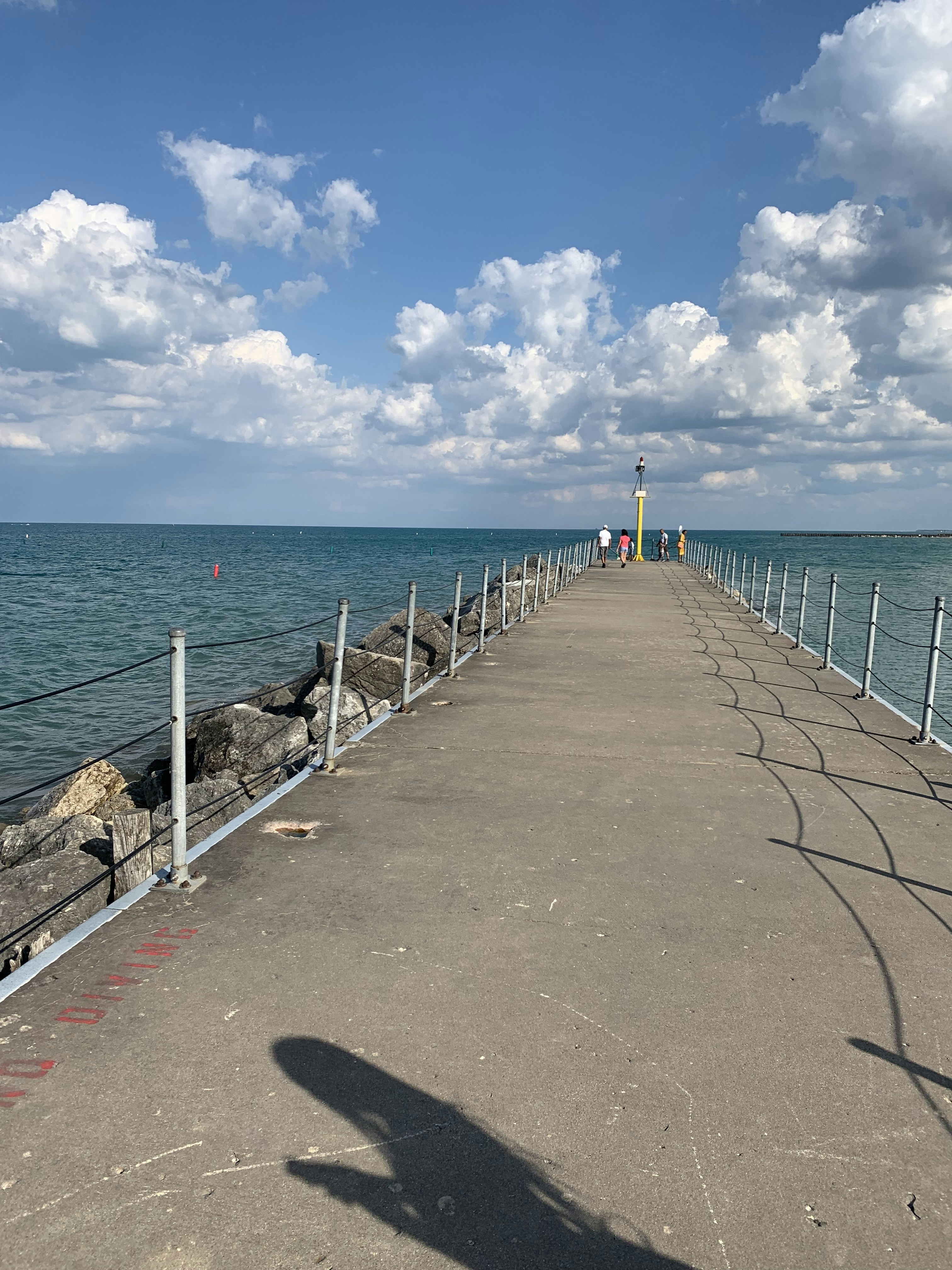 A walkway over a body of water photo – Free Water Image on Unsplash