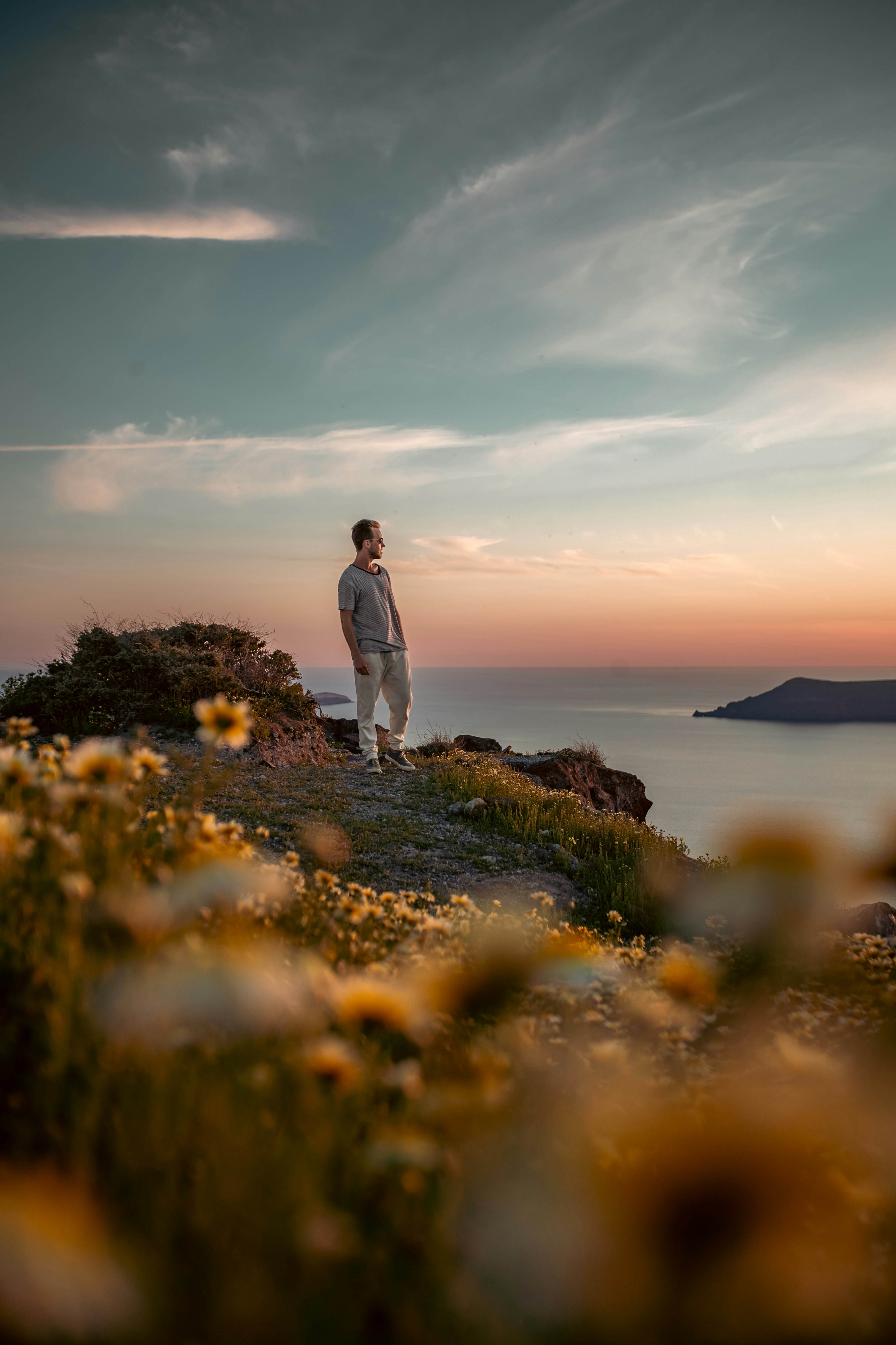 A man standing on a rocky beach photo – Free Human Image on Unsplash