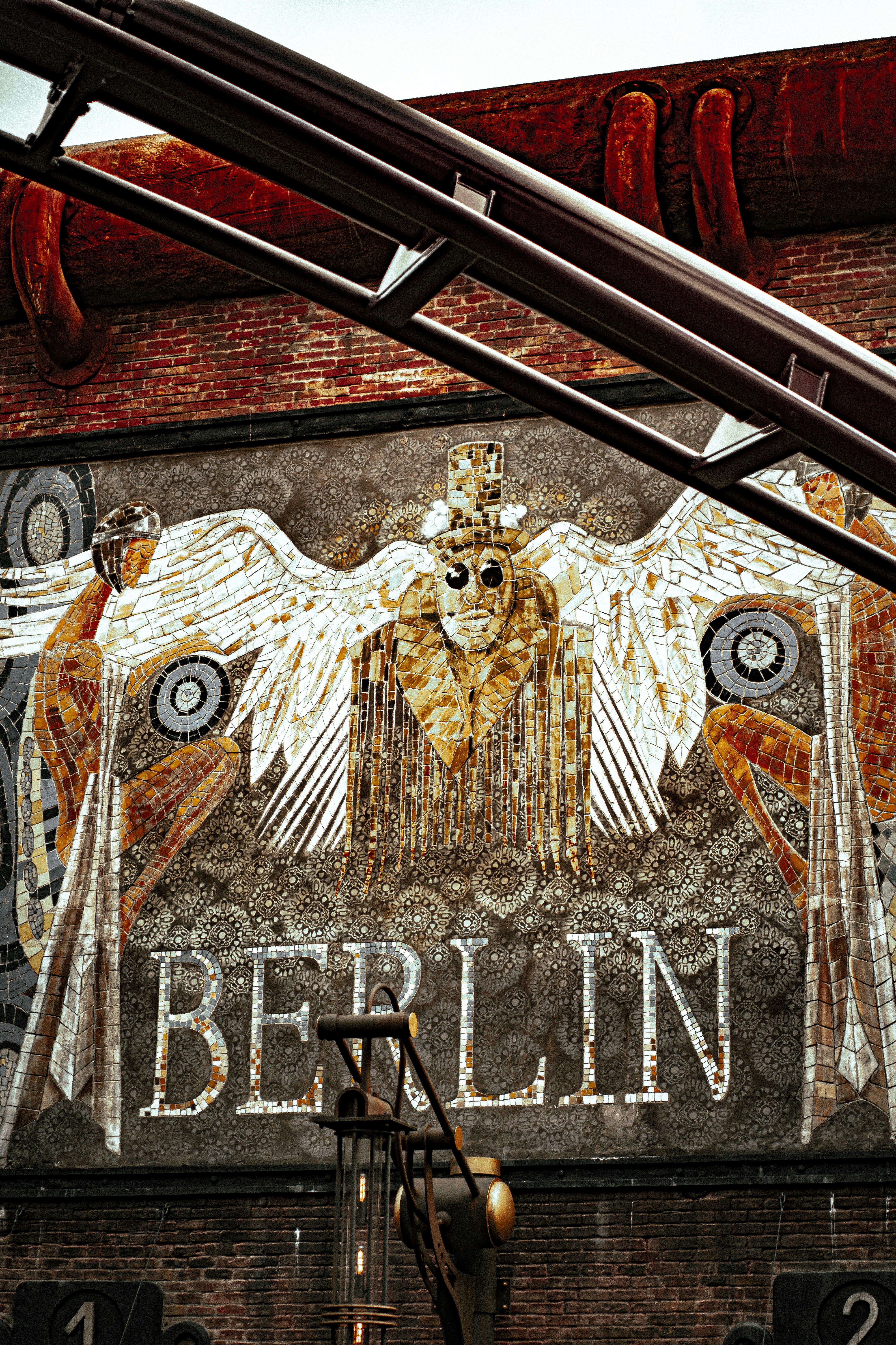 Mosaic Wings over Berlin Tiles
