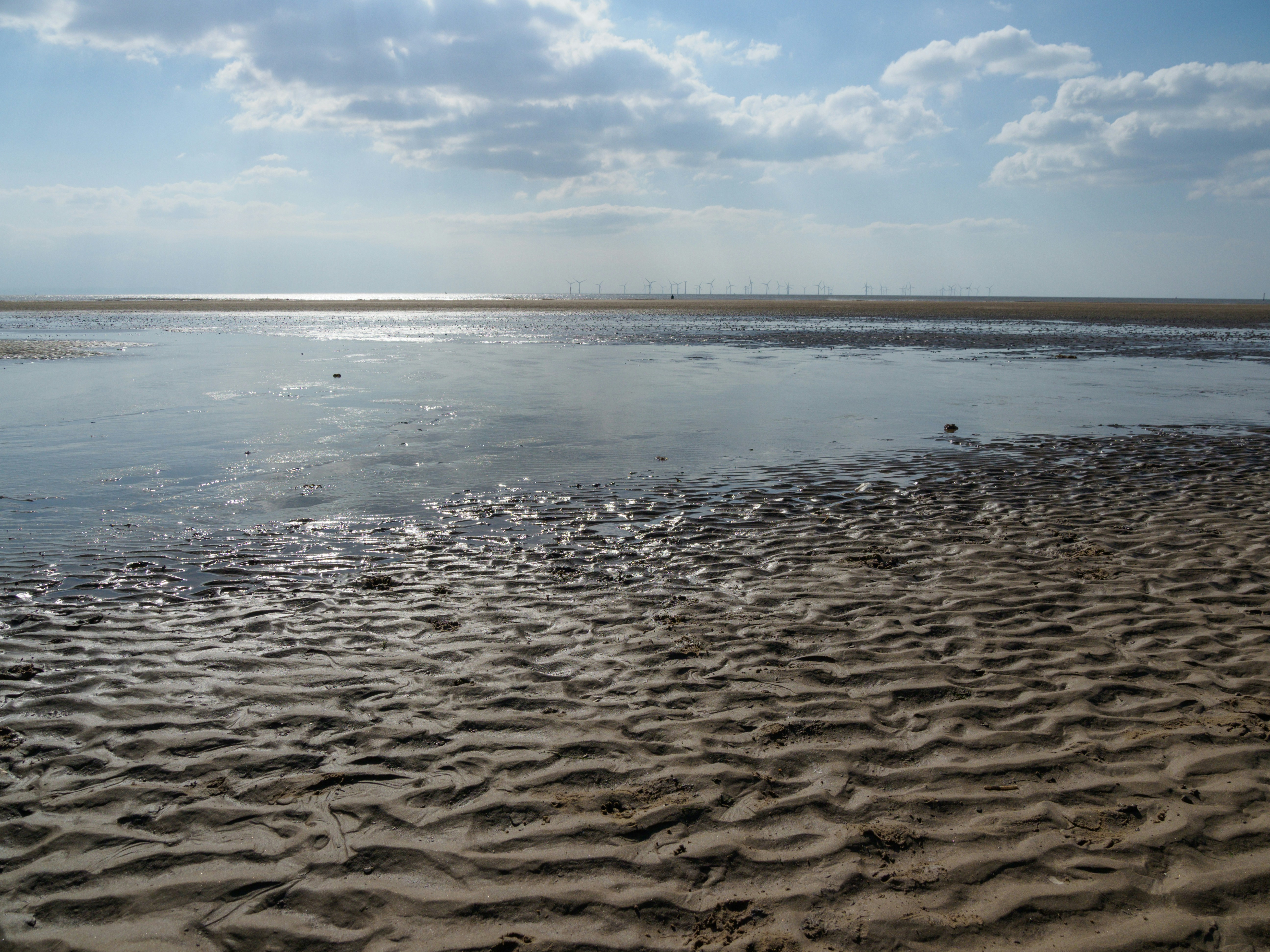 Foto zum Thema Ein Strand mit Sand und Wasser – Kostenloses Bild zu ...