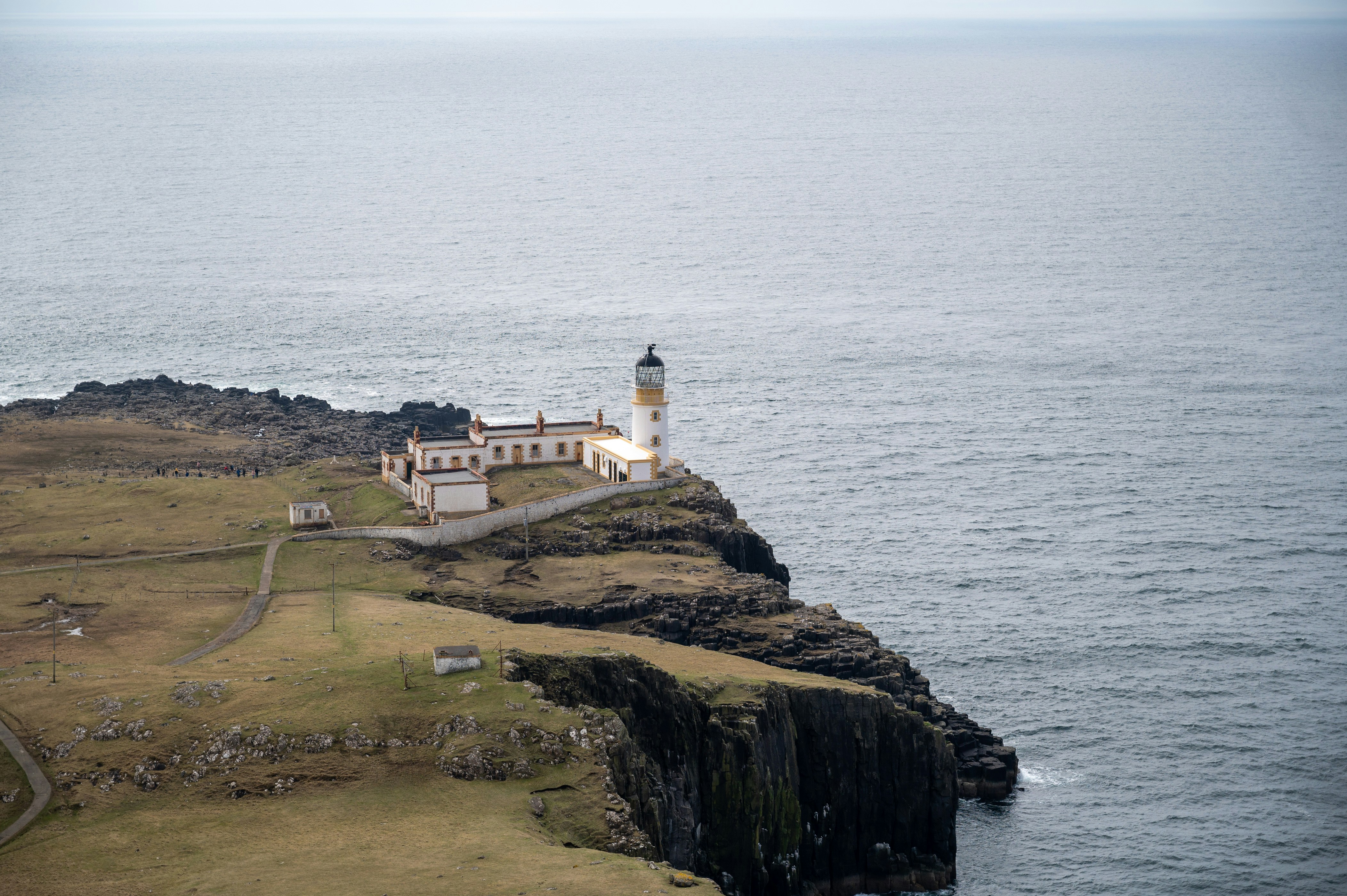 a lighthouse on a rocky island