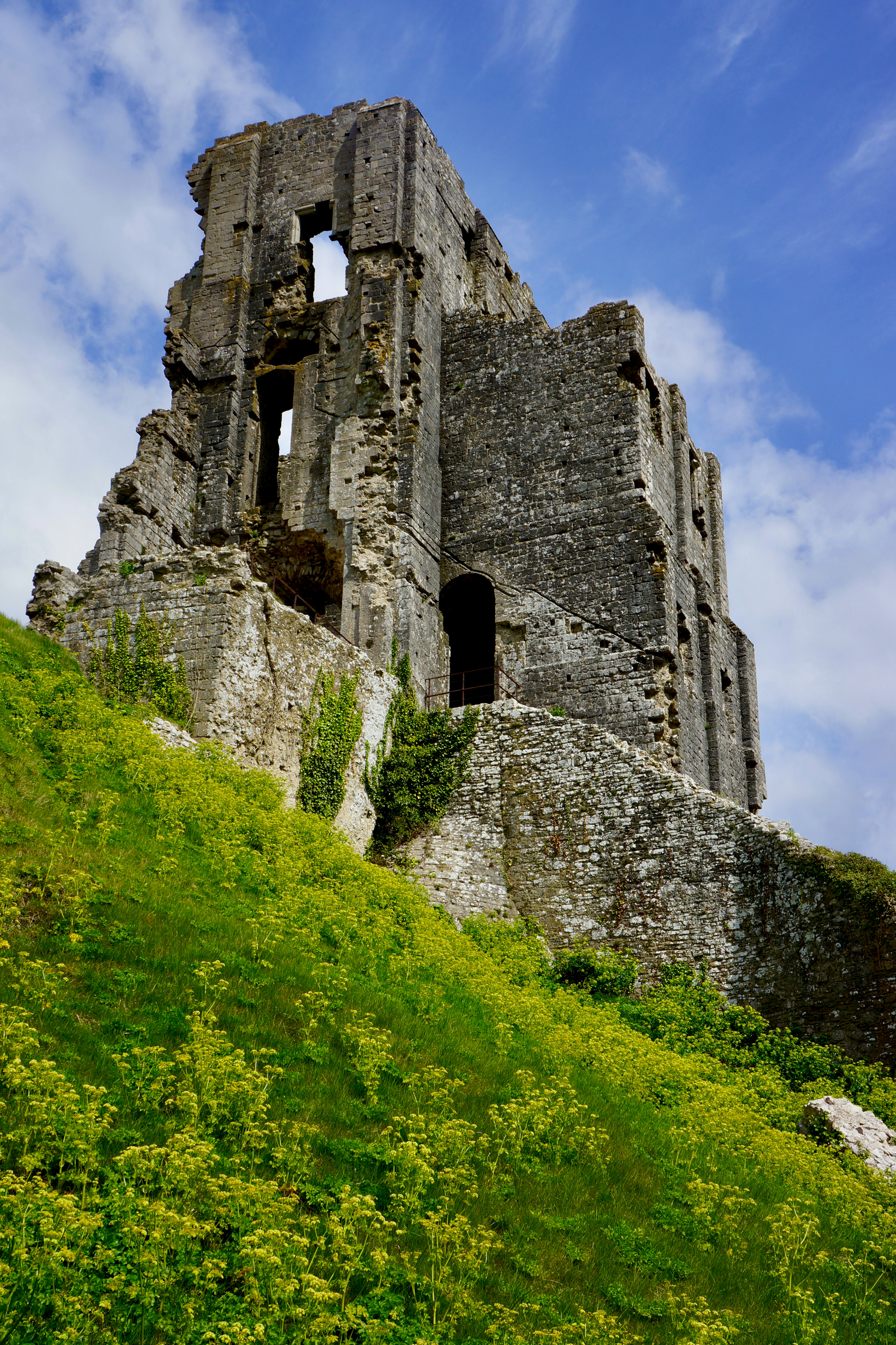 a stone castle on a hill photo – Free Corfe castle Image on Unsplash
