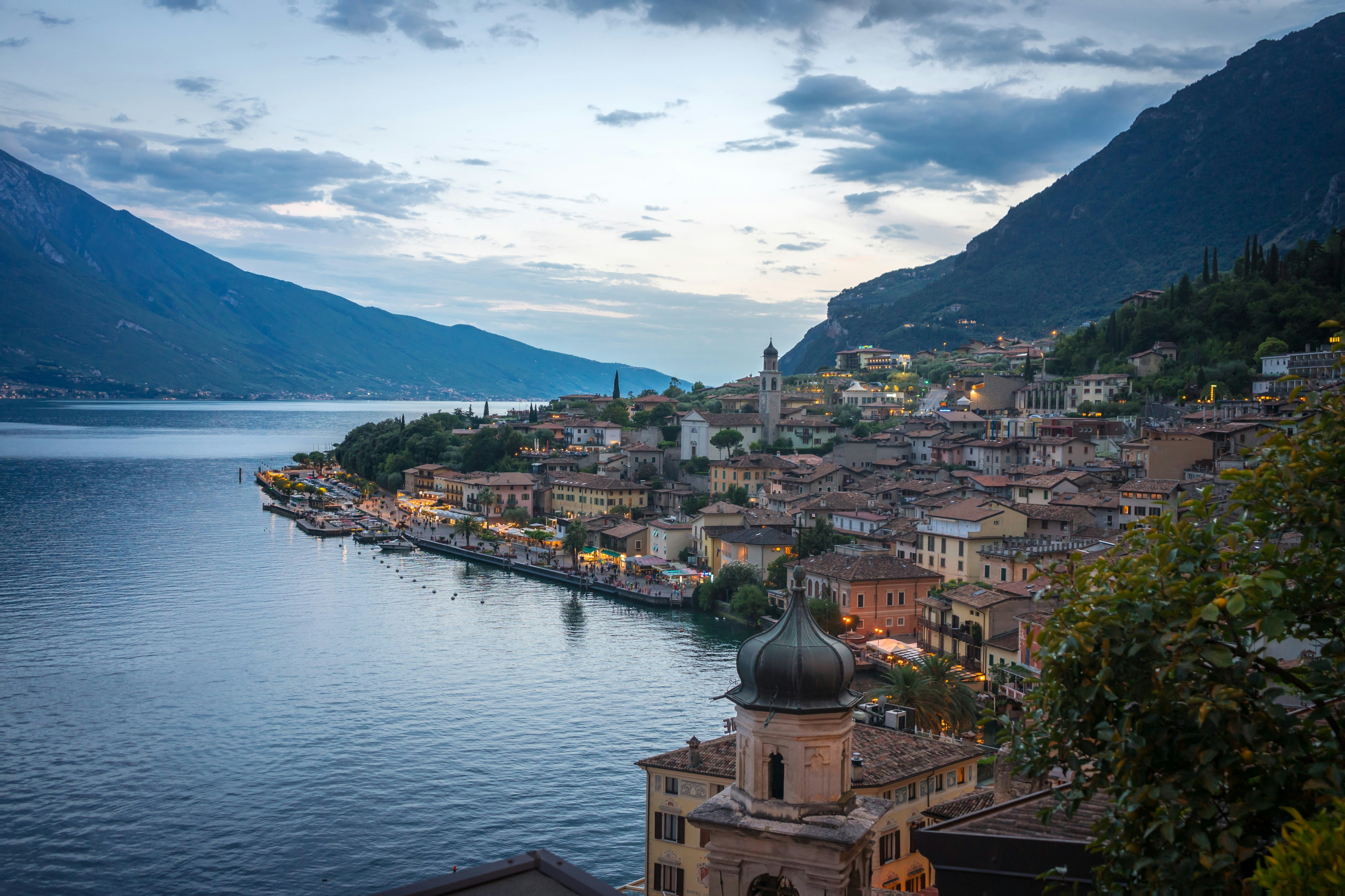 A city next to a body of water photo – Free Lago di garda Image on Unsplash