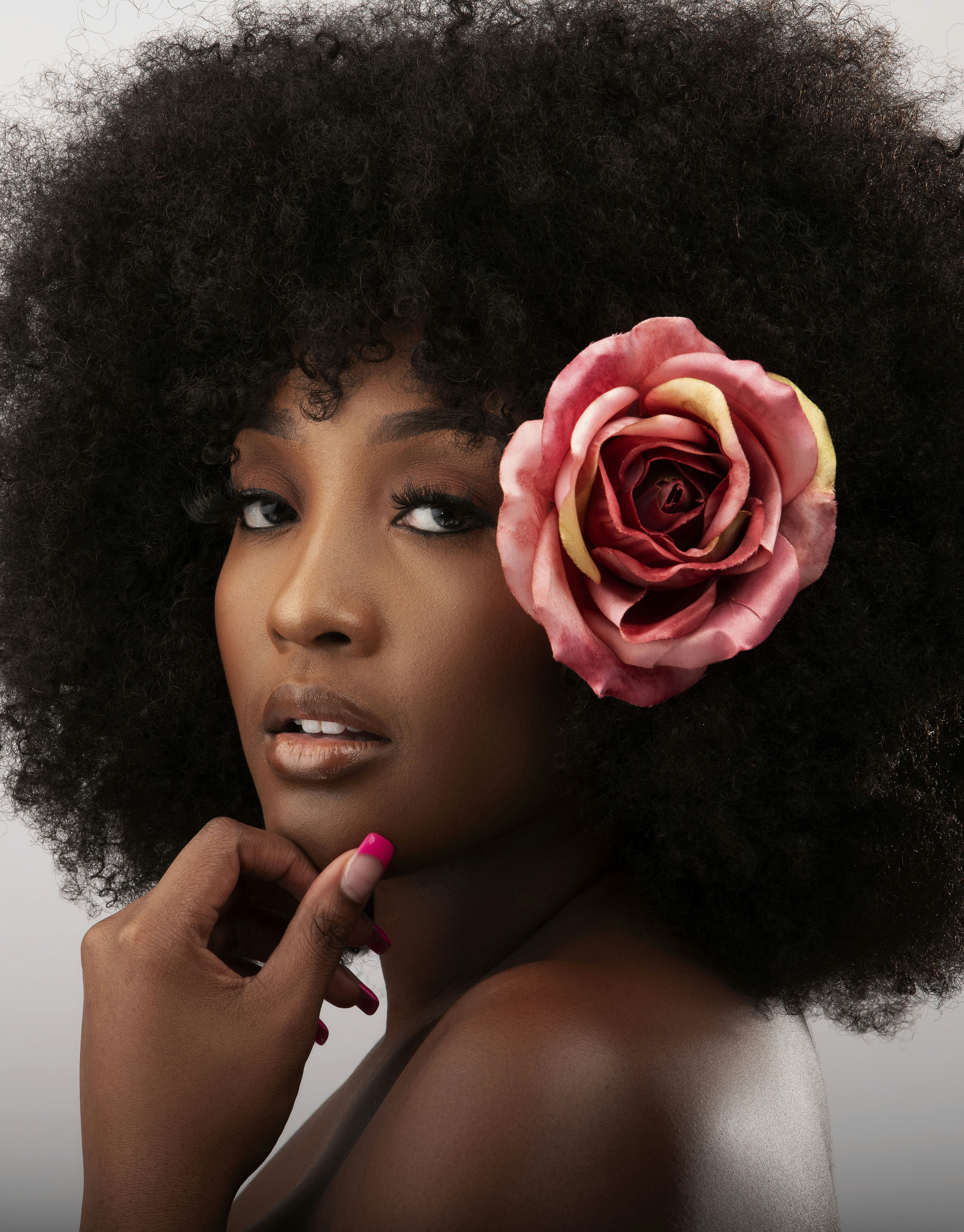 A person with a rose in the hair photo – Free Flower Image on Unsplash