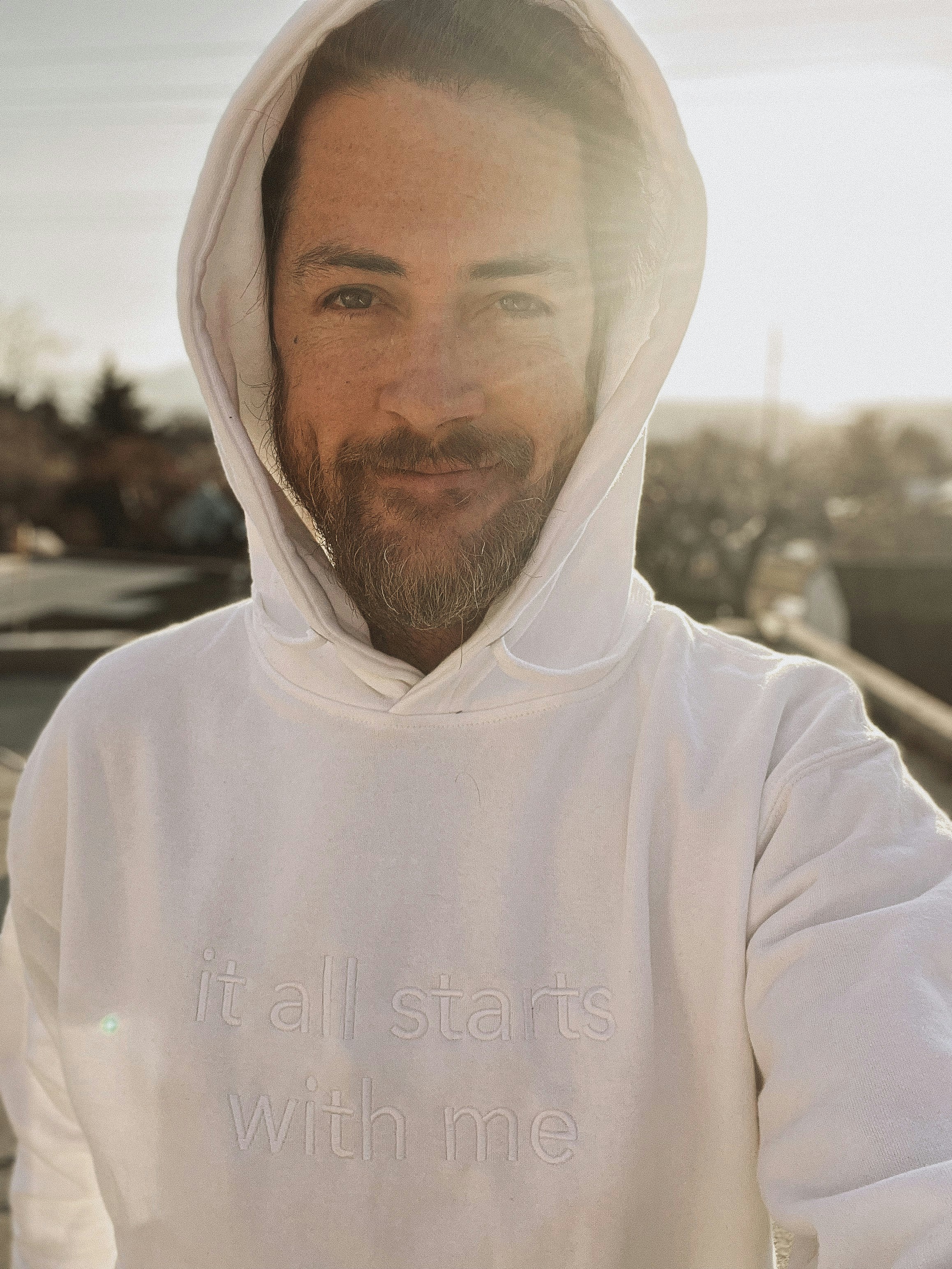 It All Starts with Me: Dawn-Backlit Rooftop Portrait in a Hoodie