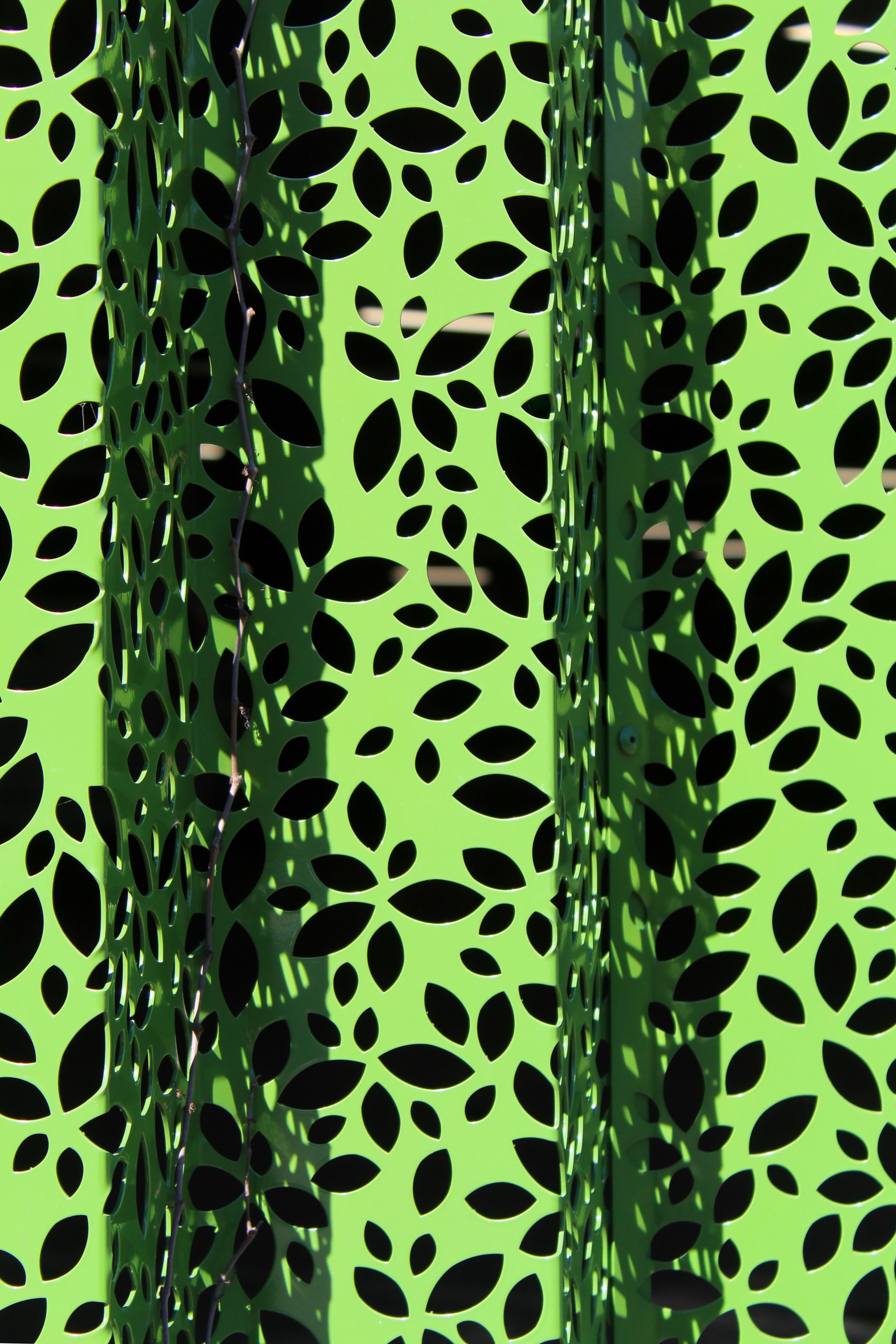 Vibrant Leaf Pattern Streaks Across a Lime Green Canvas