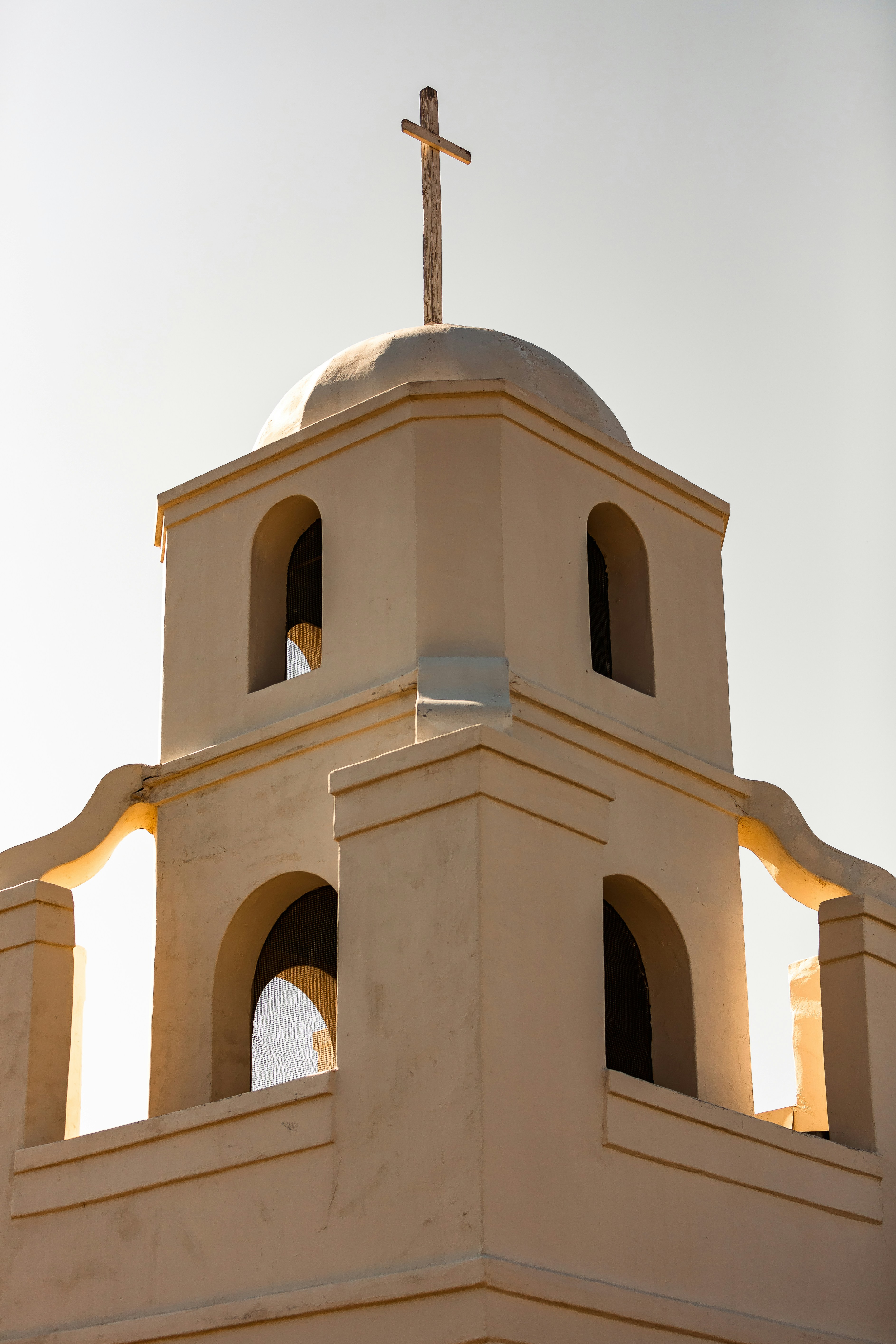A white building with a cross on top photo – Free Church Image on Unsplash