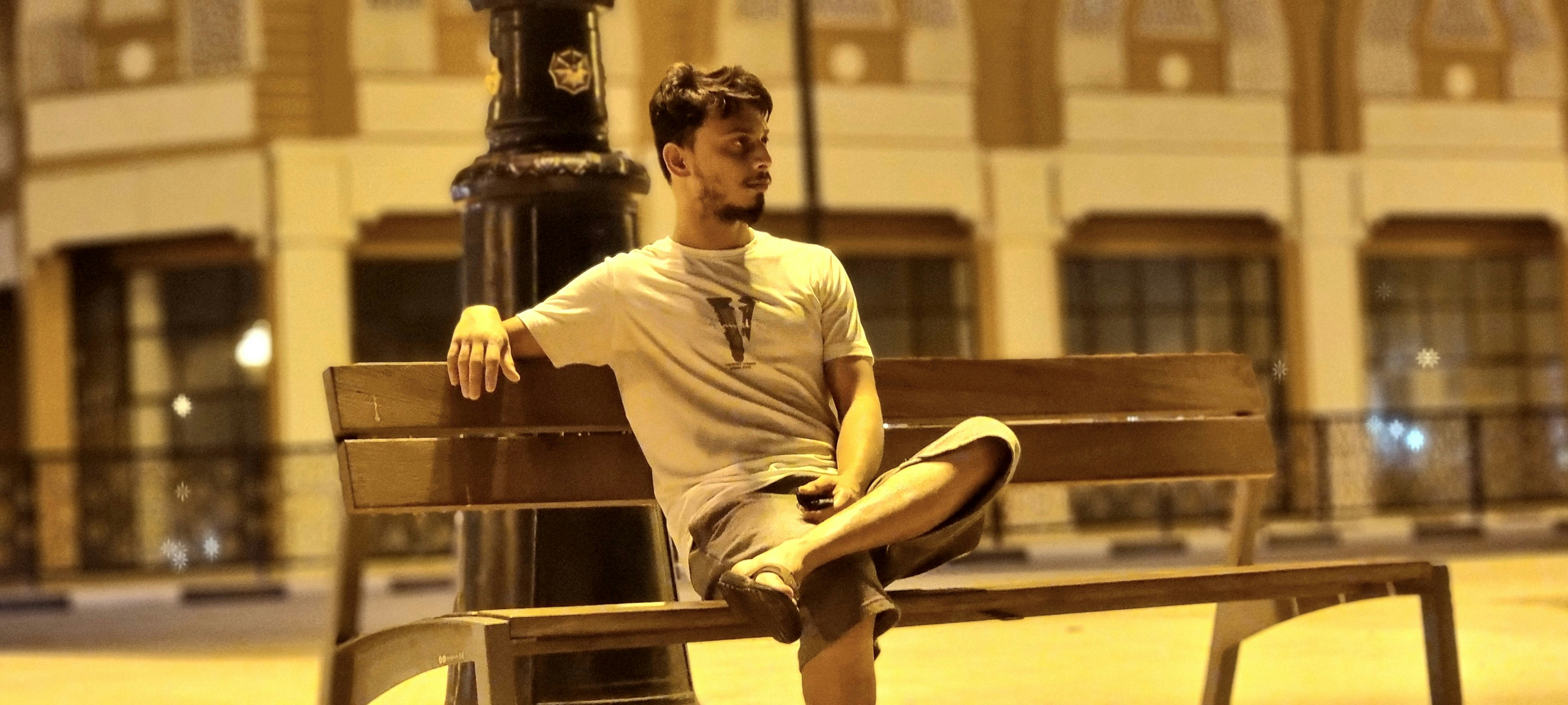 Amber Hour on a Park Bench: A Quiet Urban Night Portrait
