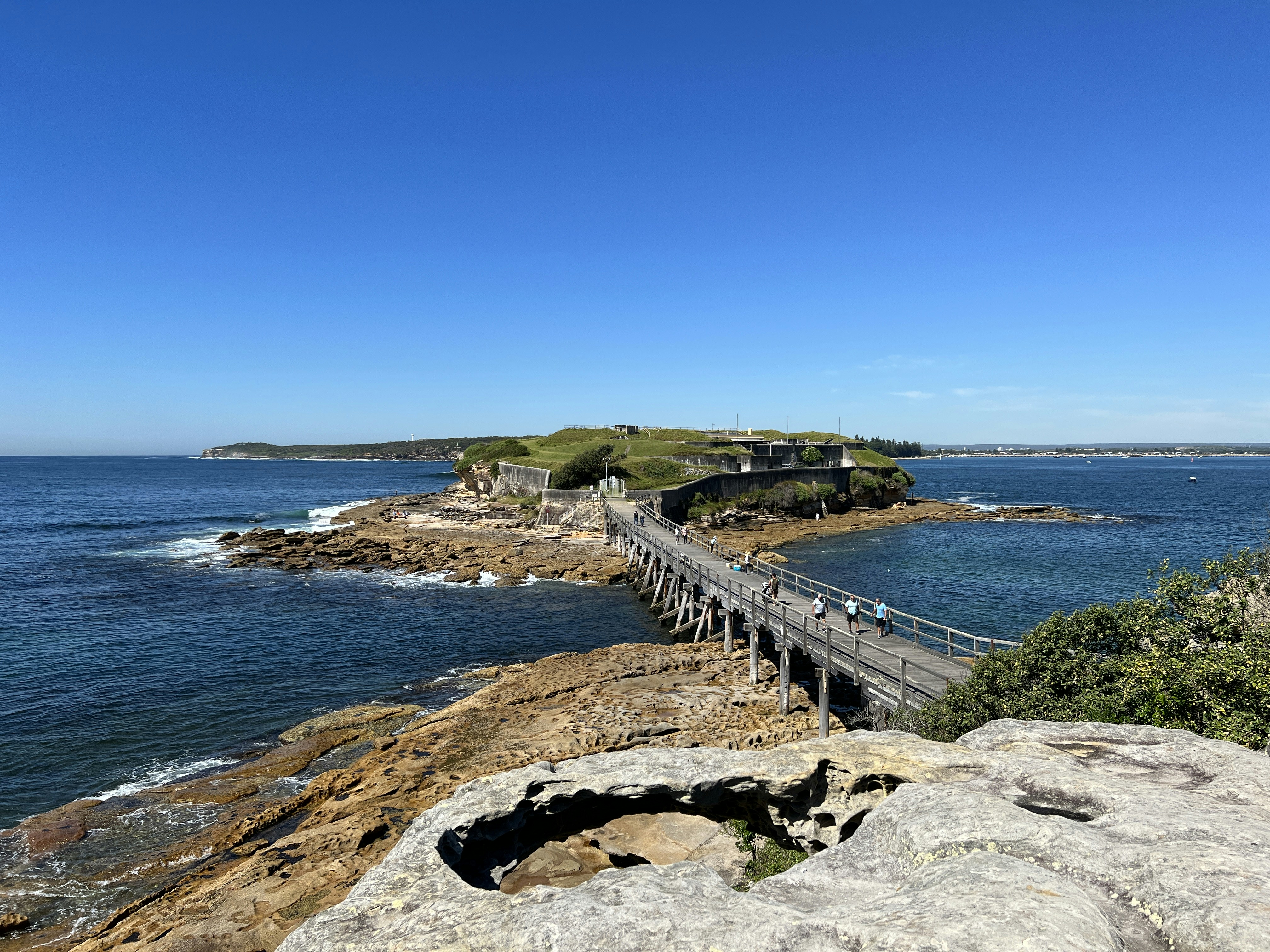A walkway over a body of water photo – Free Australia Image on Unsplash